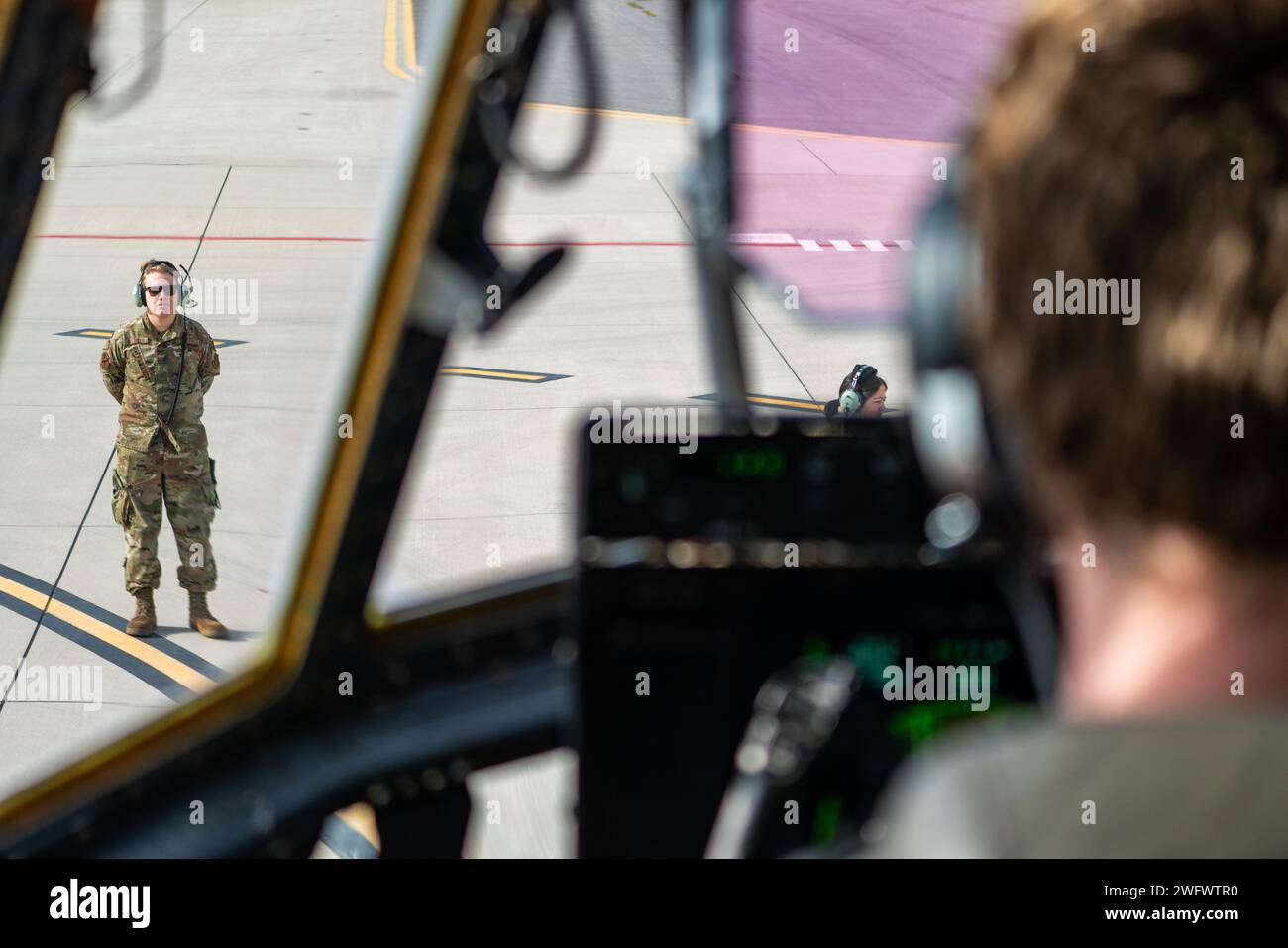 U.S. Air Force Airman 1st Class Cormac Roethler, crew chief, and Airman ...