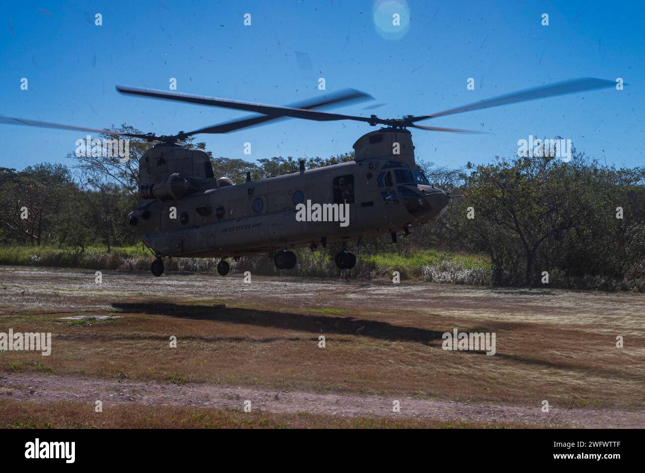 A U.S. Army CH-47 Chinook offloads pallets during a U.S. Southern ...