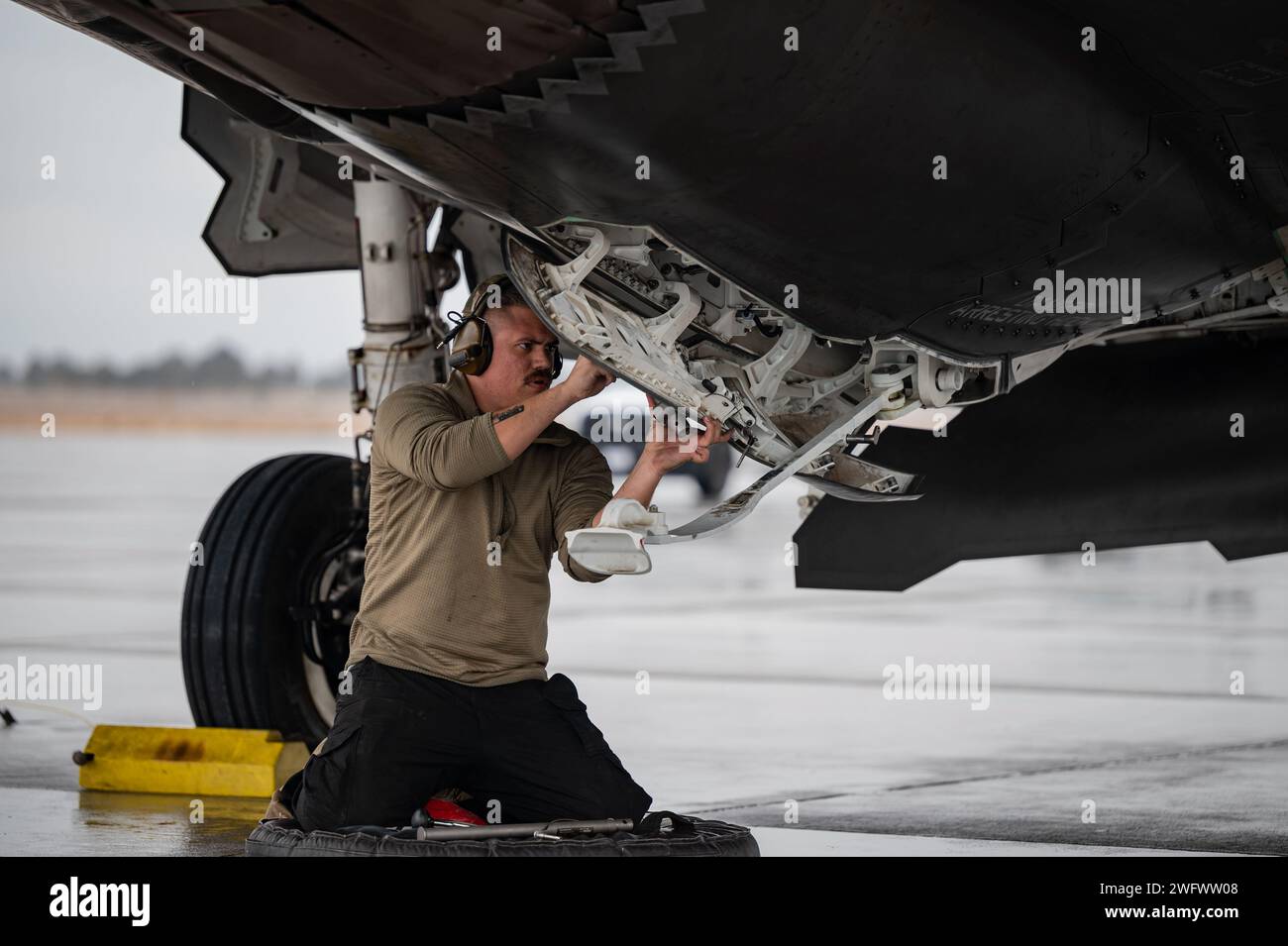 U.S. Air Force Staff Sgt. Kyle Lind, a crew chief assigned to the 421st ...