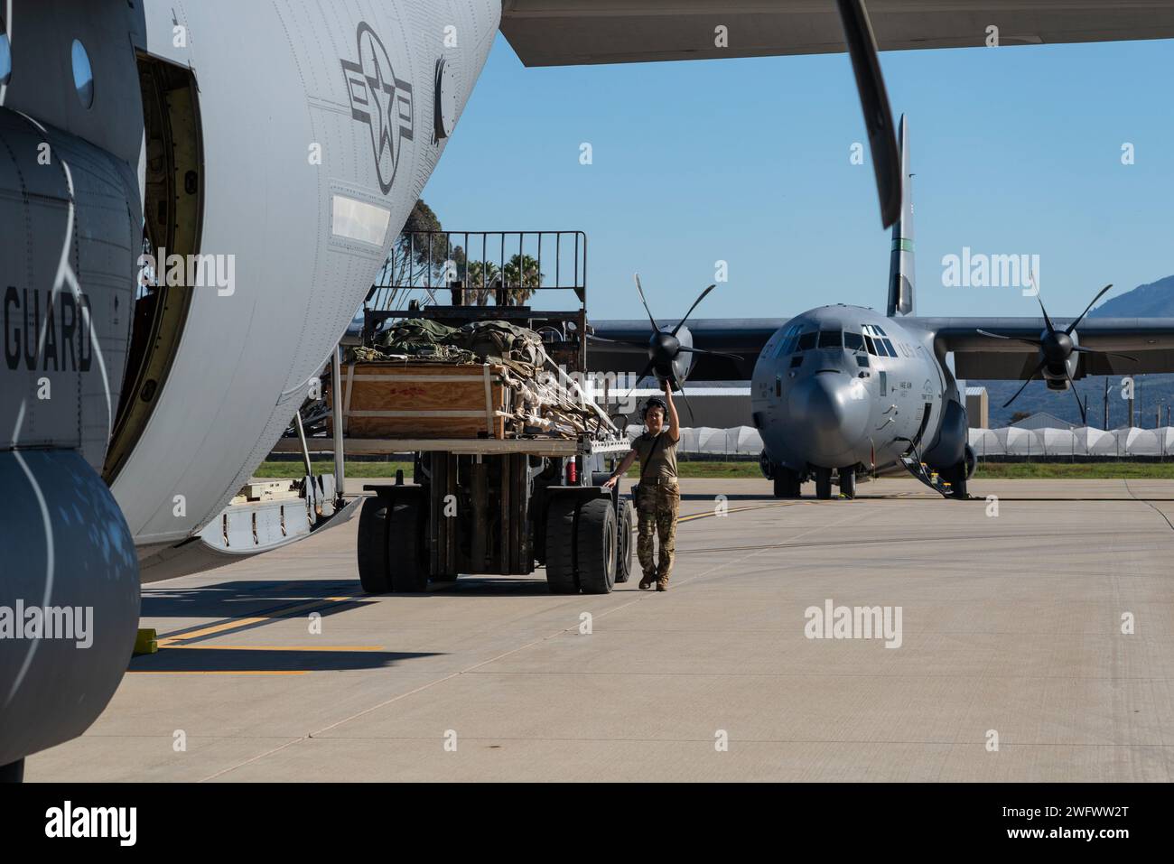 U.S. Air Force Airman 1st Class Candace Alonzo, a loadmaster assigned ...
