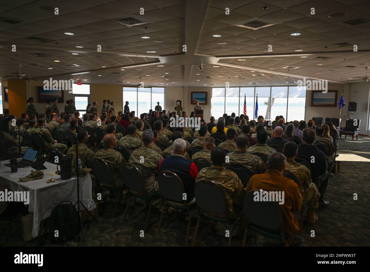 Members attend the change of command ceremony for the 39th Electronic ...