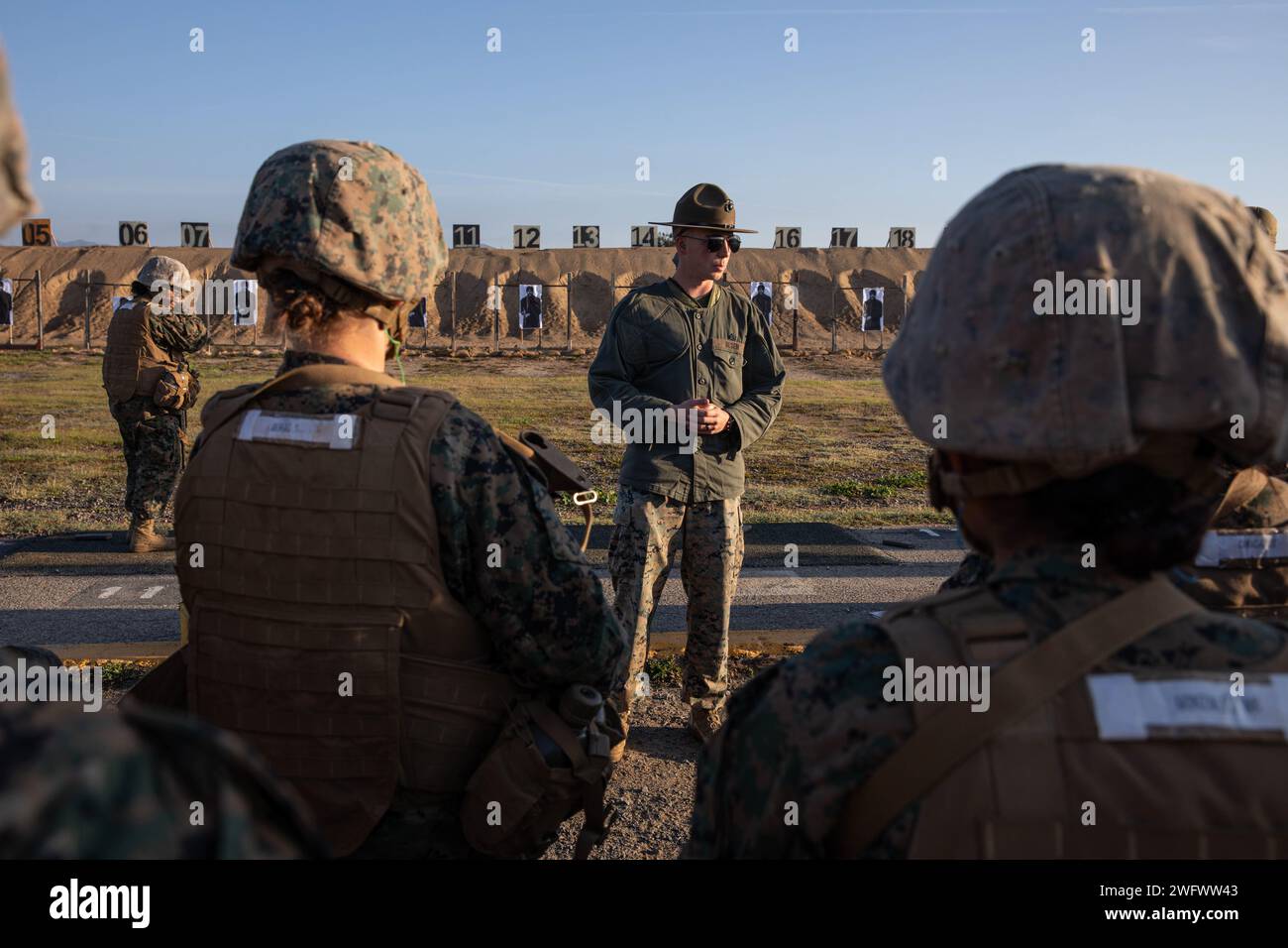 U.S. Marine Corps primary marksmanship instructor Sgt. Kyl Olsen, a ...
