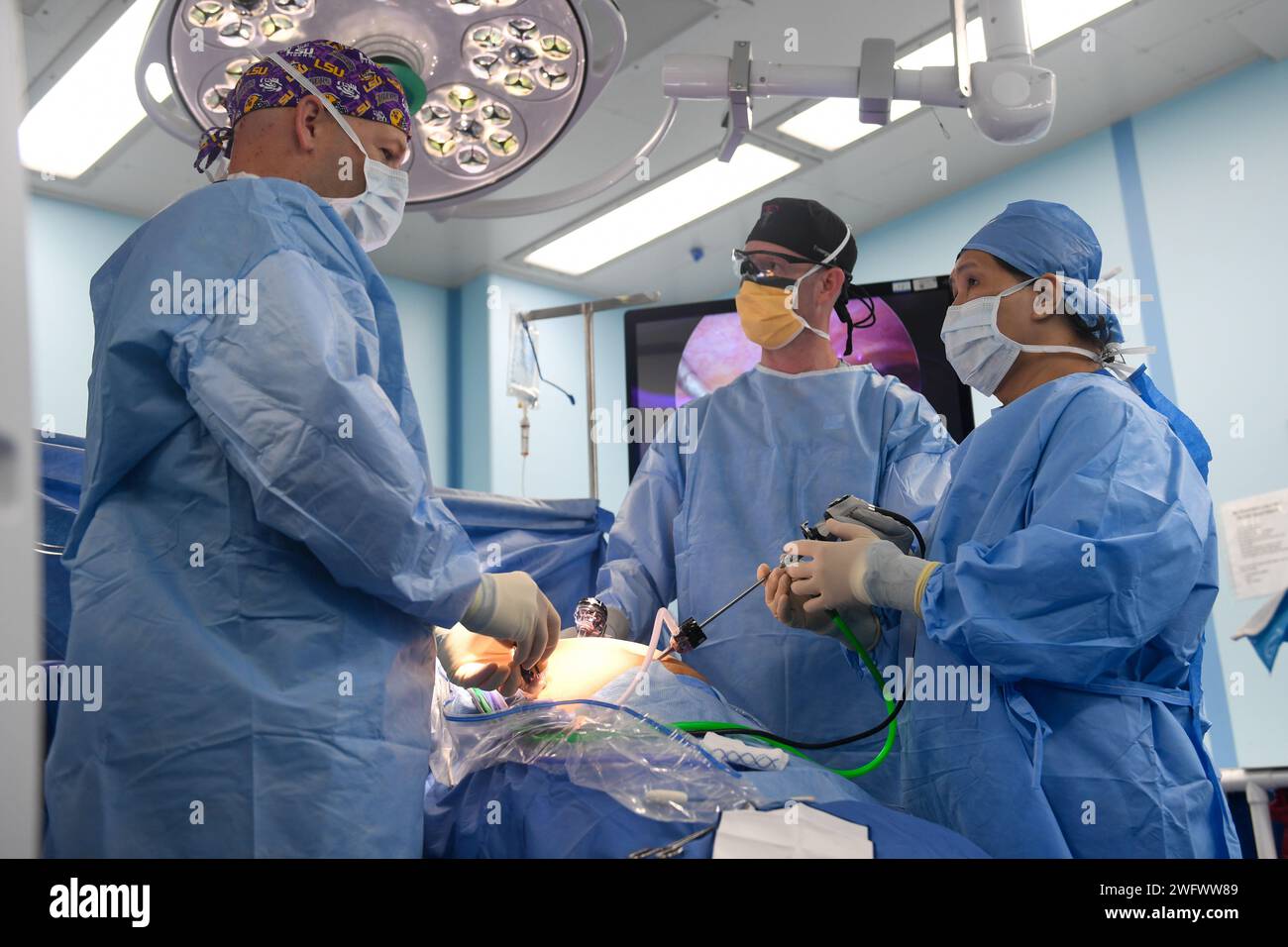 From the left, U.S. Navy Cmdr. Jason Butler, from Forest, La., Balau ...