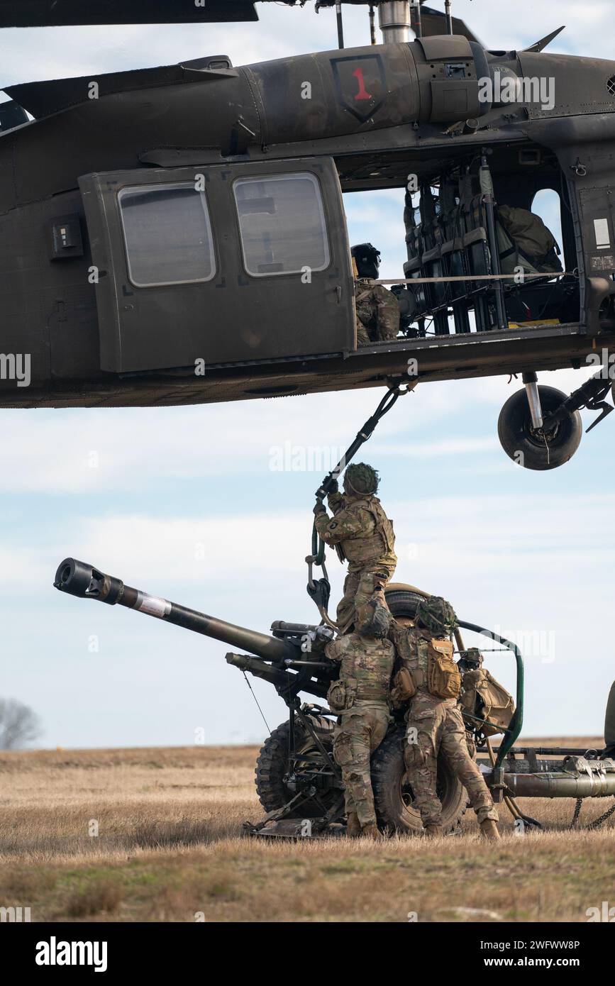 Artillery soldiers with Bravo Battery, 3rd Battalion, 320th Field Artillery Regiment, 3rd ...