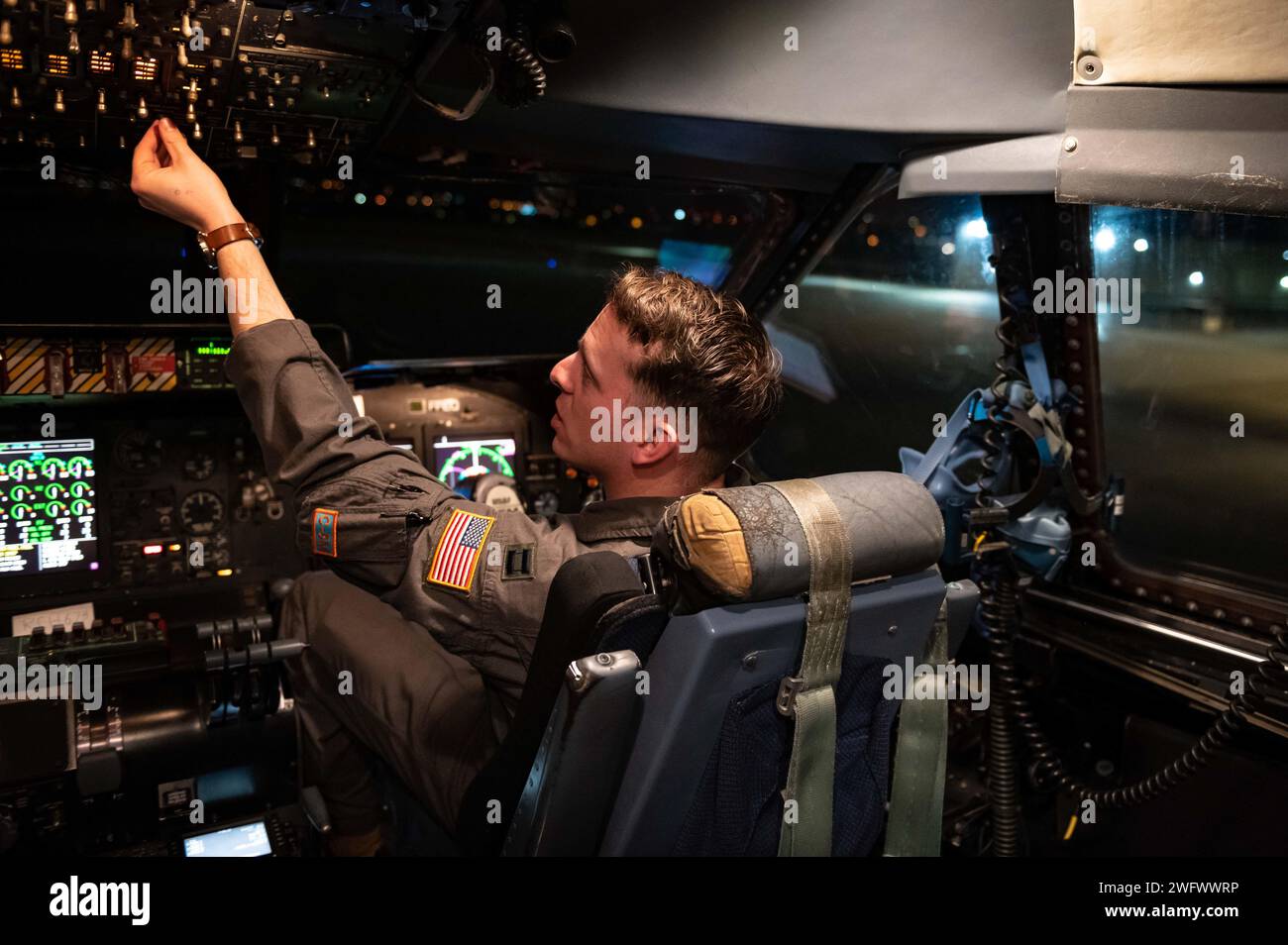 U.S. Air Force Capt. Ryan Adams, 9th Airlift Squadron pilot, prepares a ...