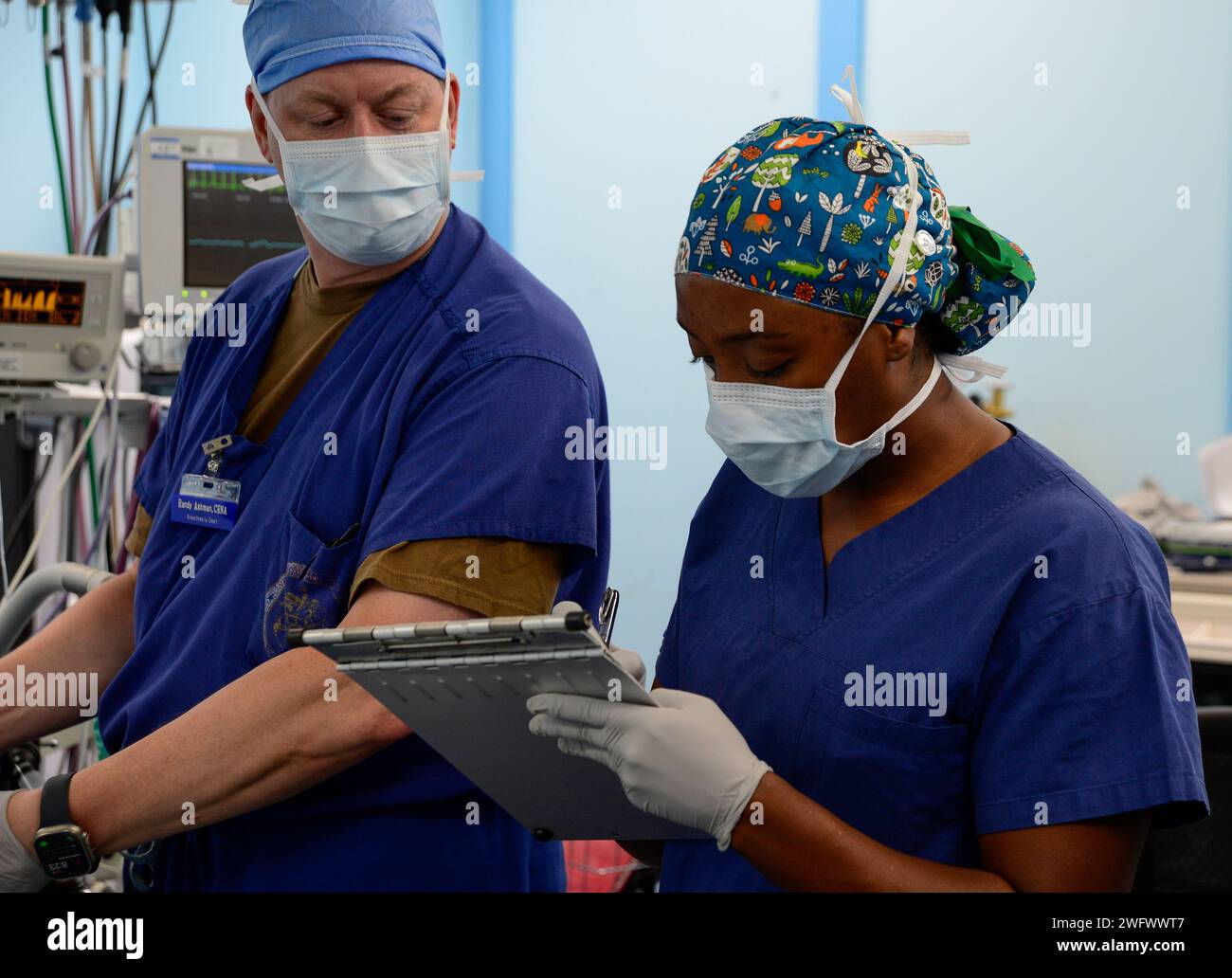 U.S. Navy Hospital Corpsman 2nd Class Aisha Downie, right, from Corpus ...