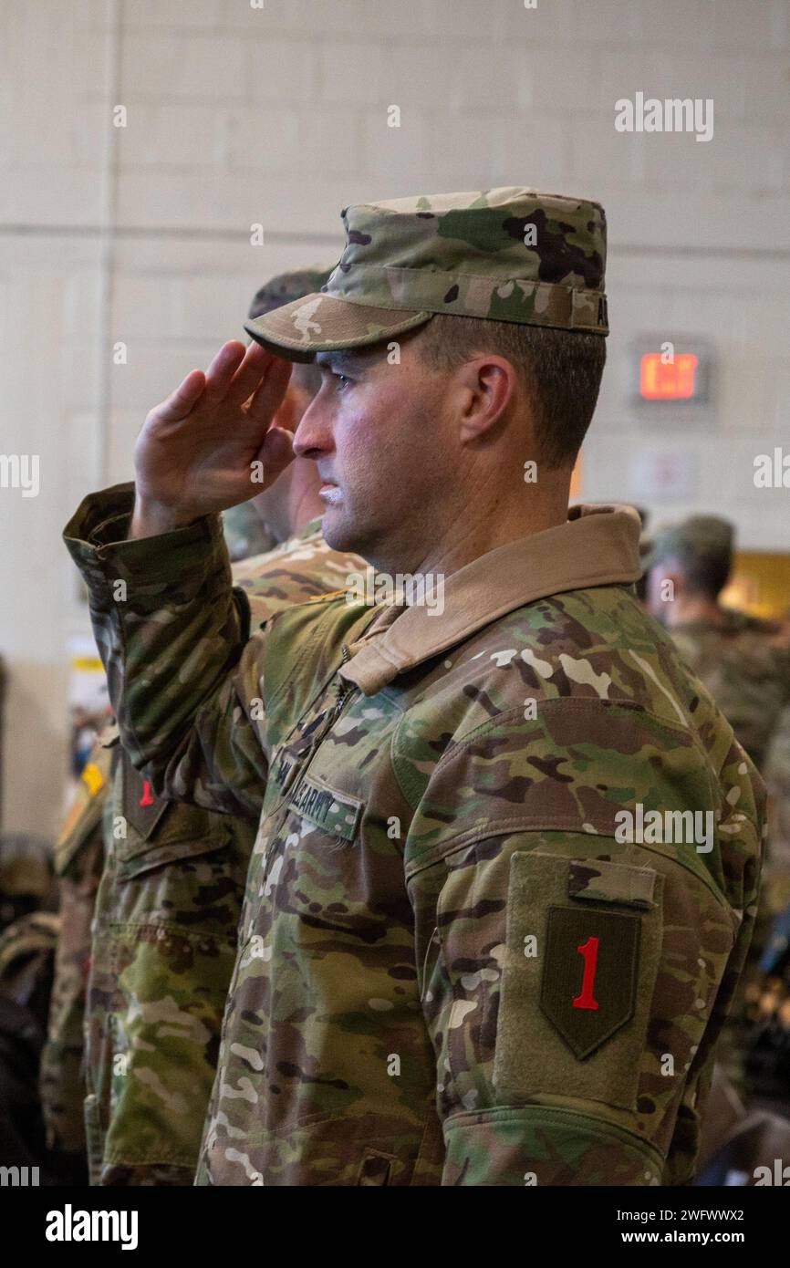 U.S. Army Soldier salutes the flag during the national anthem during ...