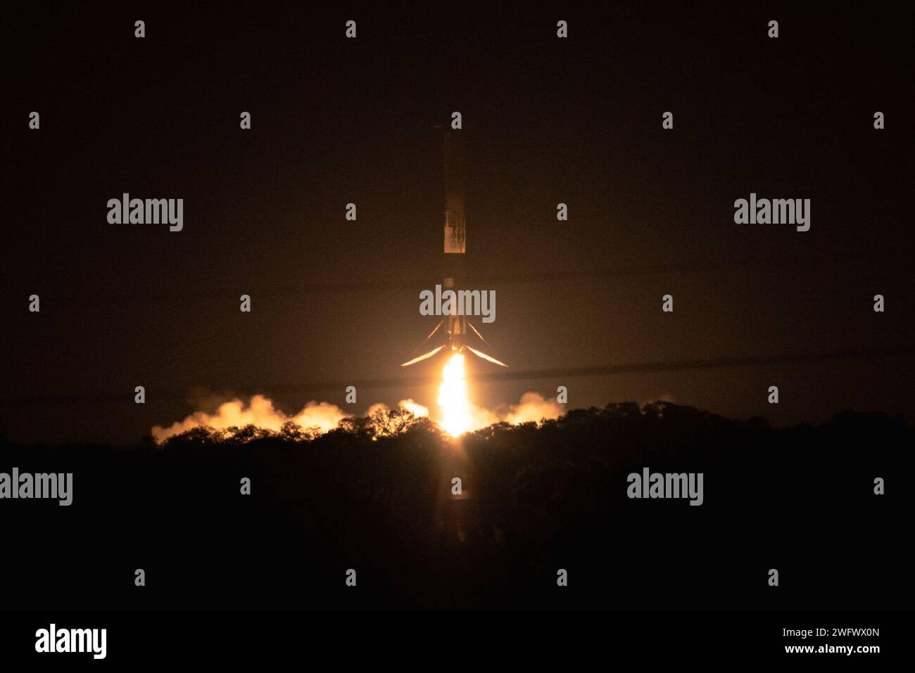A Falcon 9 booster lands at Launch Zone 1 at Cape Canaveral Space Force ...