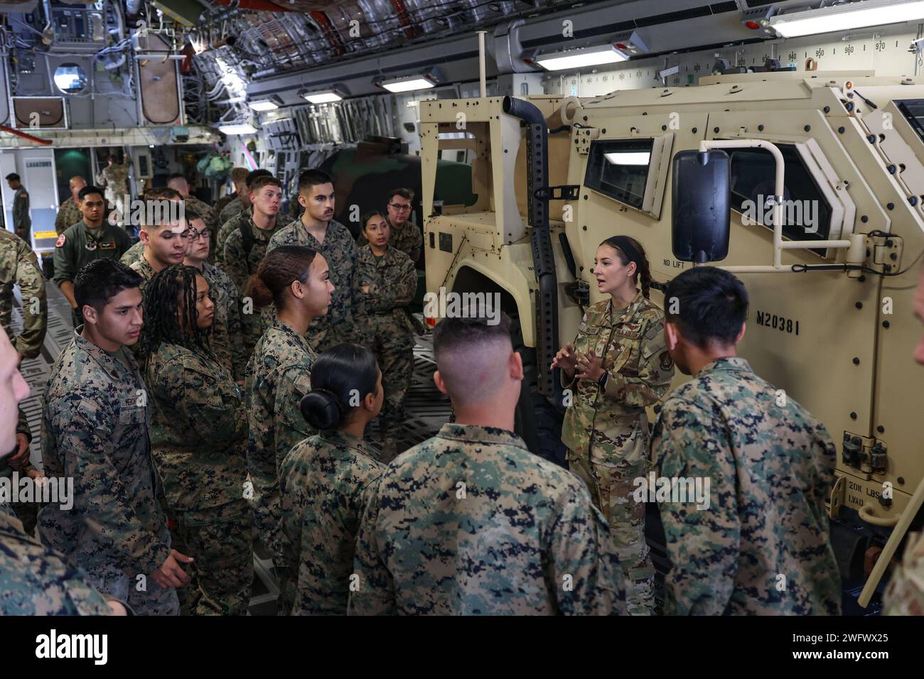 U.S. Air Force Staff Sgt. Jo Besse, a C-17 Globemaster III load master ...