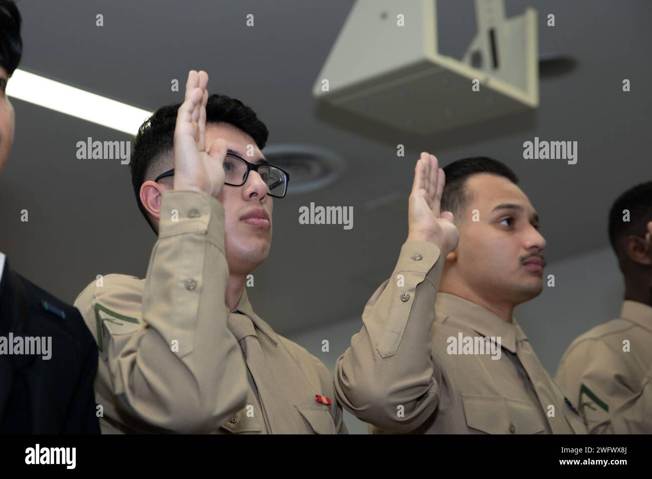 U.S. Marine Corps Lance Cpl. Carlos MurilloGarcia, left, a cryogenics ...