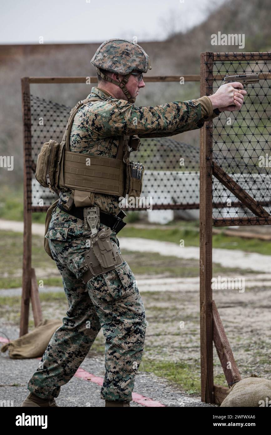 U.S. Marine Corps Cpl. Alexander Devereux, a combat photographer, with ...
