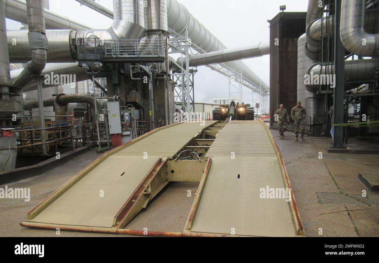 The bridge component of an Armored Vehicle Launched Bridge is emplaced ...