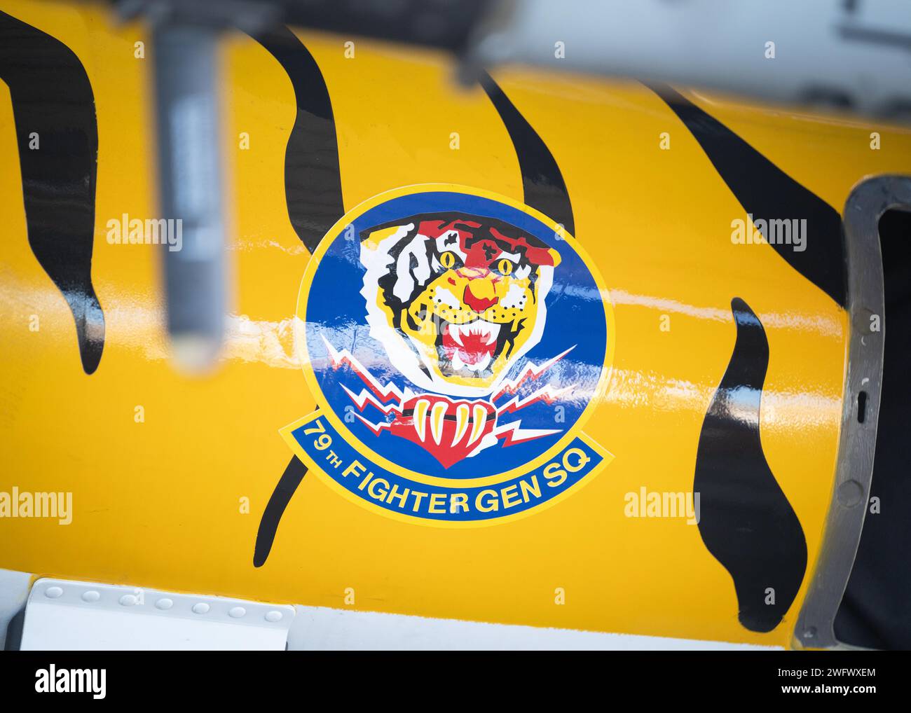 The 79th Fighter Generation Squadron (FGS) “Tigers” emblem is displayed ...