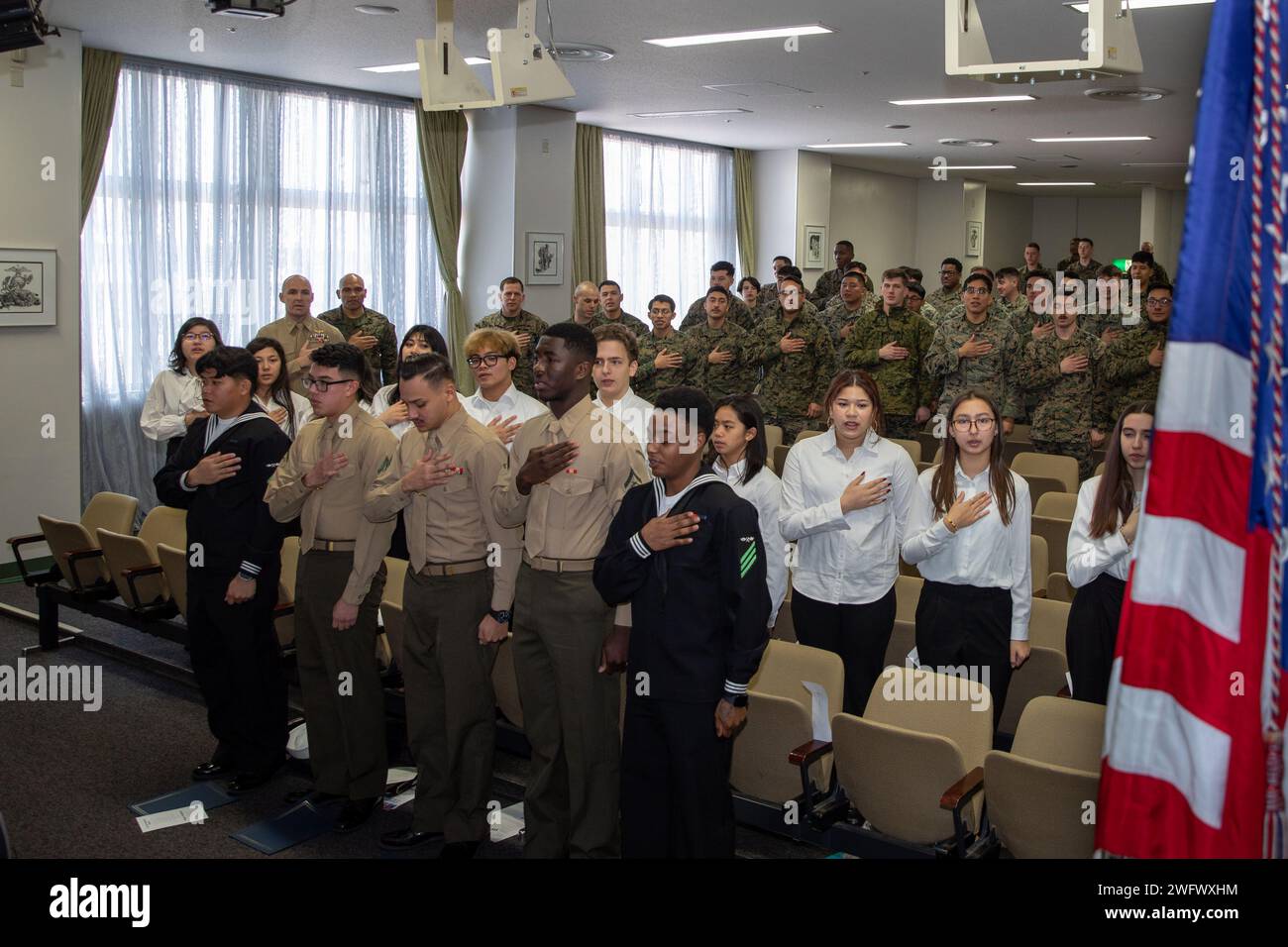 U.S. service members at Marine Corps Air Station Iwakuni and students ...