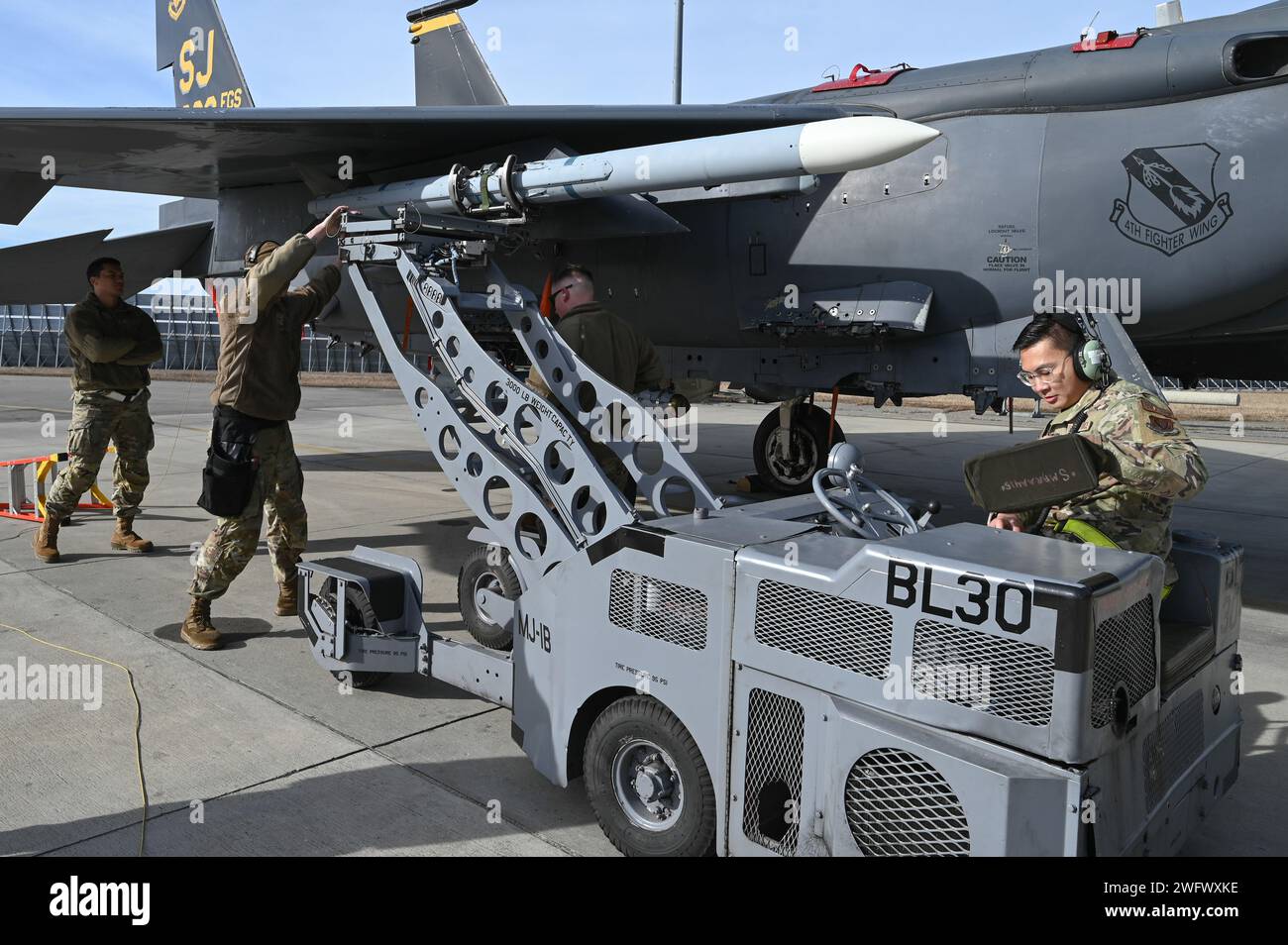 U.S. Airmen assigned to the 336th Fighter Generation Squadron load ...