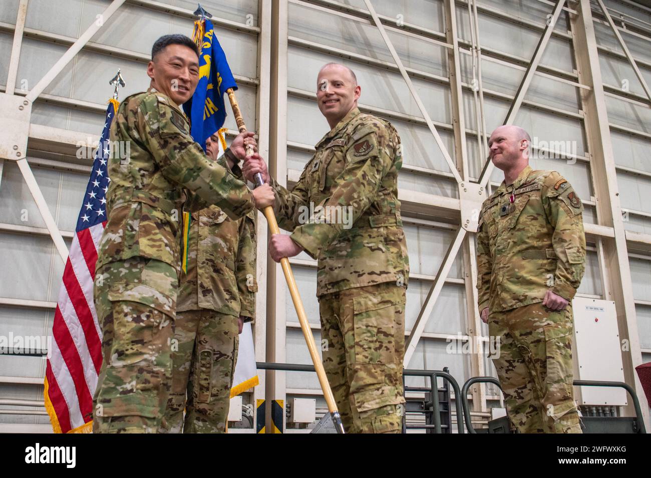 U.S. Air Force Col. Jun Oh, left, 374th Operations Group commander ...