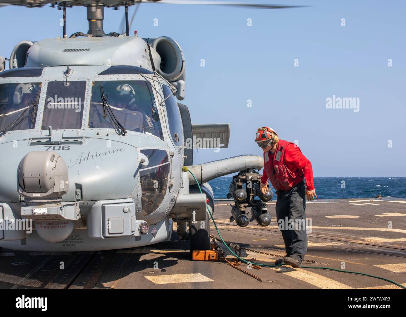 Aviation Ordanceman 3rd Class Christian Hutchins conducts a pre-flight ...
