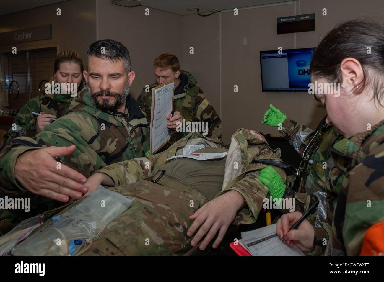 U.S. Air Force Senior Master Sgt. Michael Schmuke, left, 18th Medical ...