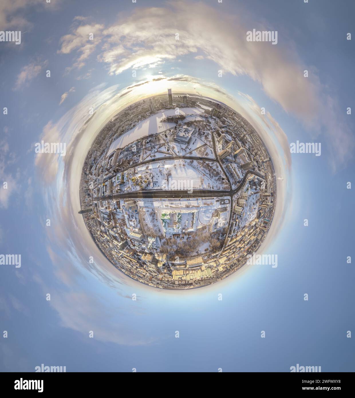 Aerial winter city view with crossroads and roads, houses, buildings ...