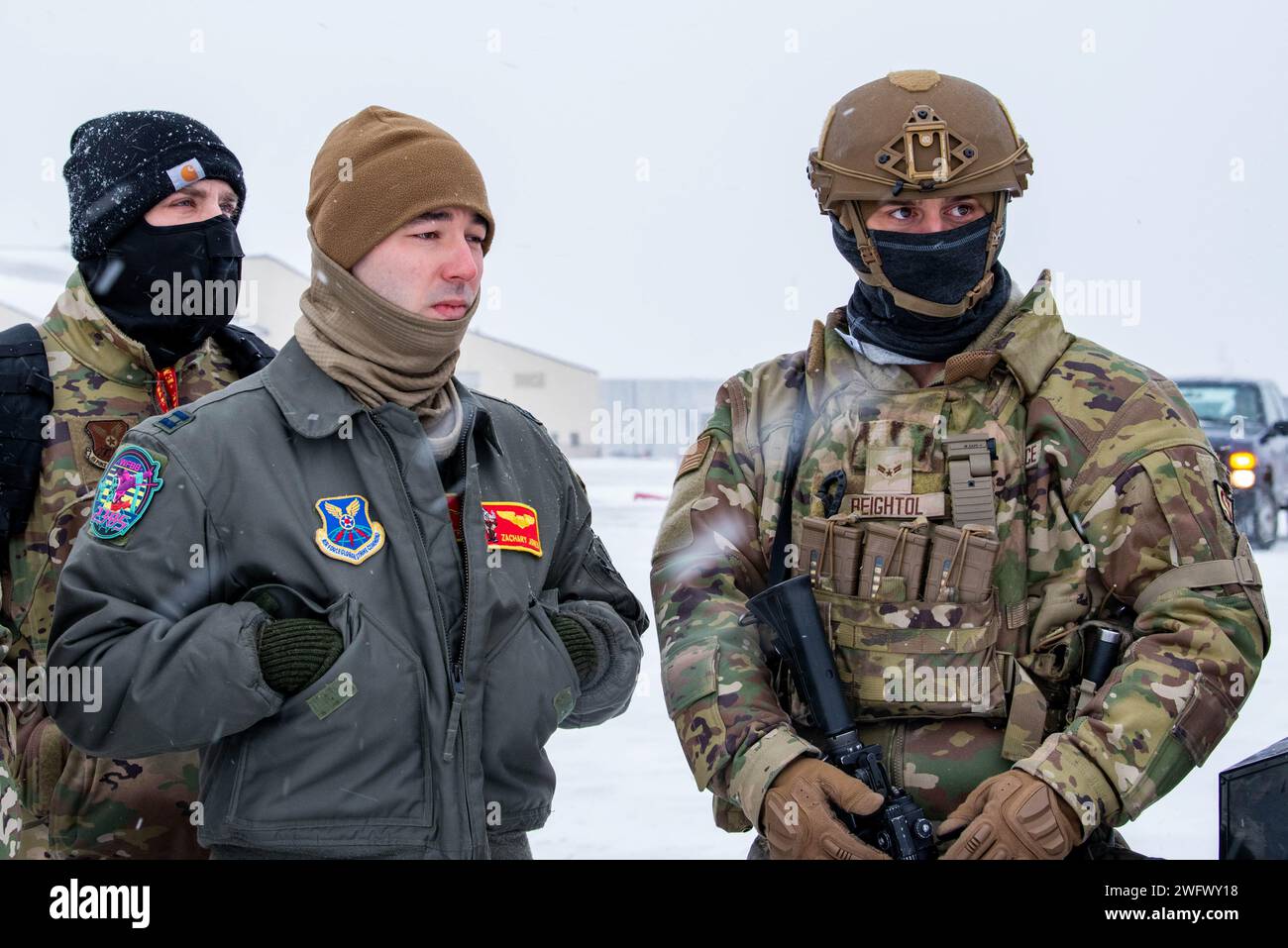 Team Minot Airmen wait for permission to enter an exclusion area during ...