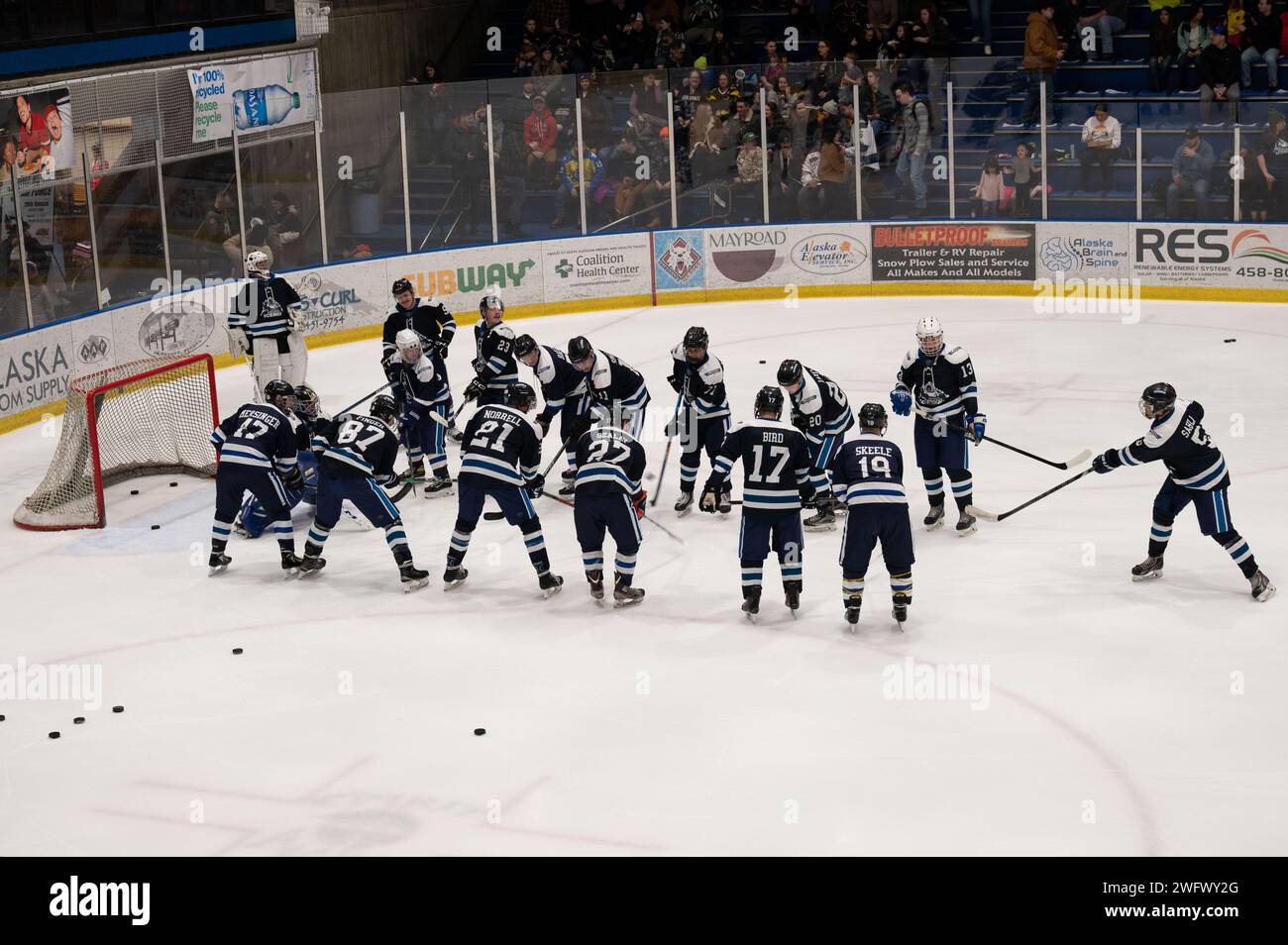 The Eielson Icemen perform warm up drills ahead of the Commander’s Cup ...