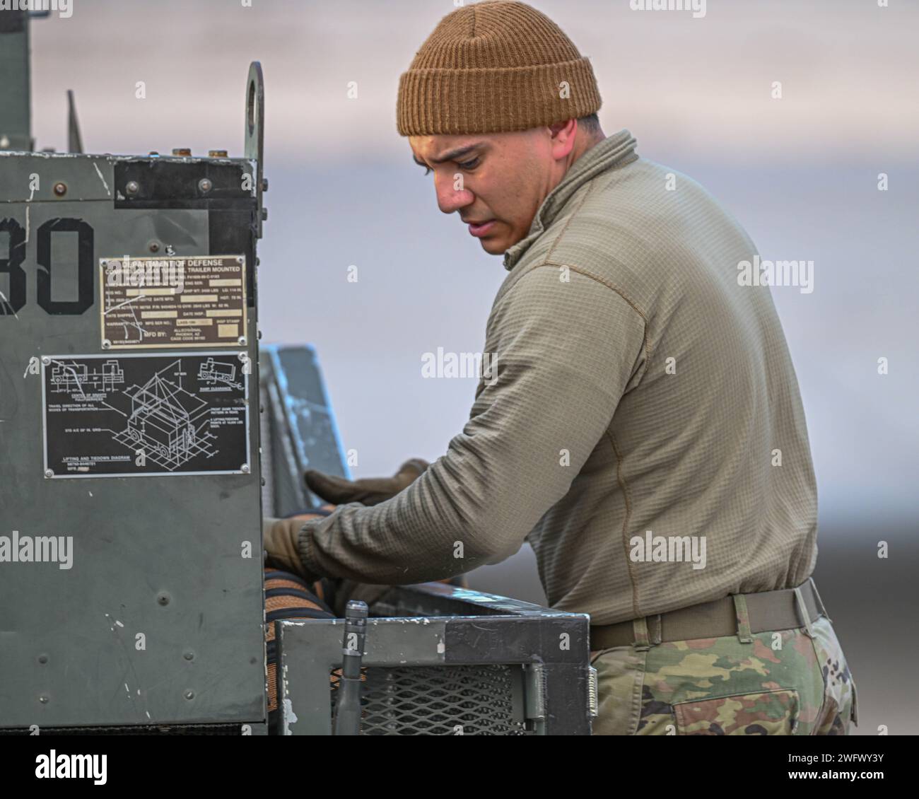 Airman assigned to the 509th Maintenance Group performs maintenance on ...