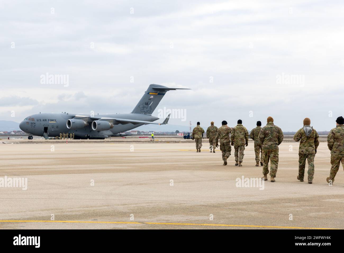 Members of 1st Battalion, 126th Aviation Regiment retrograde nine UH-60 ...