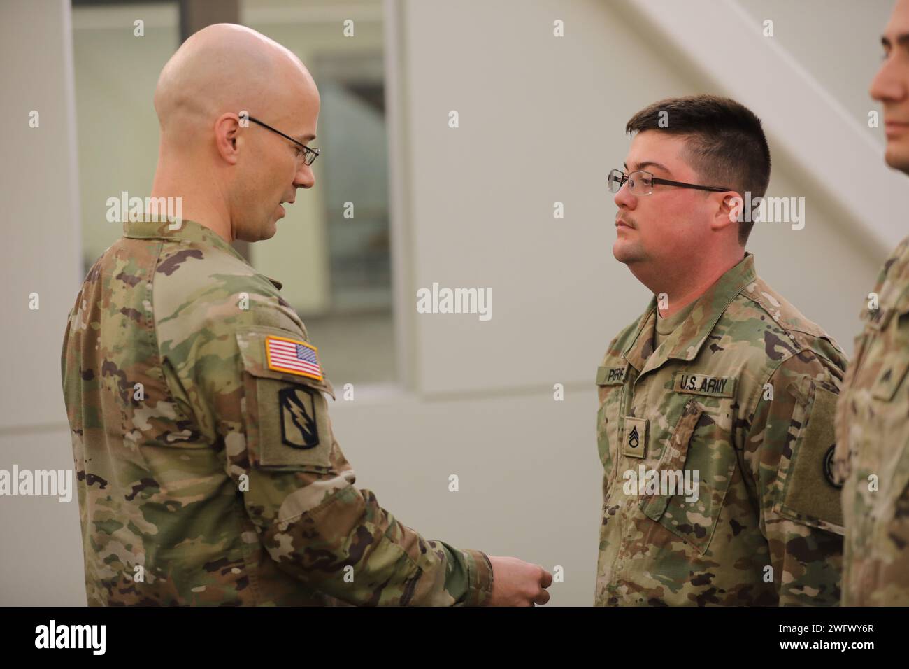 11 Soldiers of the 35th Infantry Division Artillery were promoted to ...