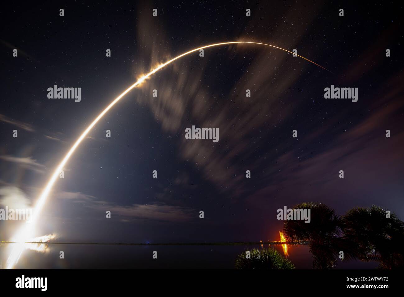 A Falcon 9 rocket carrying 23 Starlink satellites launches from Space ...