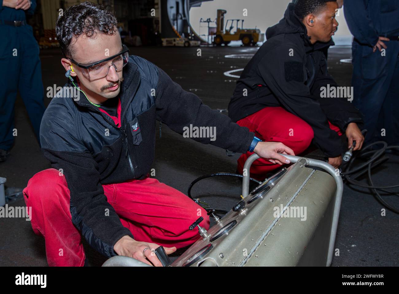 240122-N-ED228-1087 PACIFIC OCEAN (Jan. 22, 2024) Damage Controlman 3rd ...