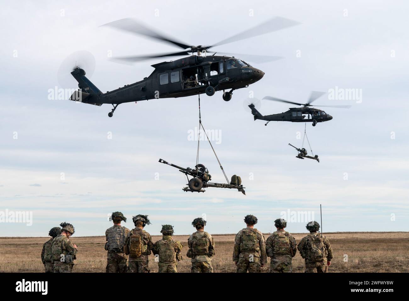 Artillery soldiers with Bravo Battery, 3rd Battalion, 320th Field ...