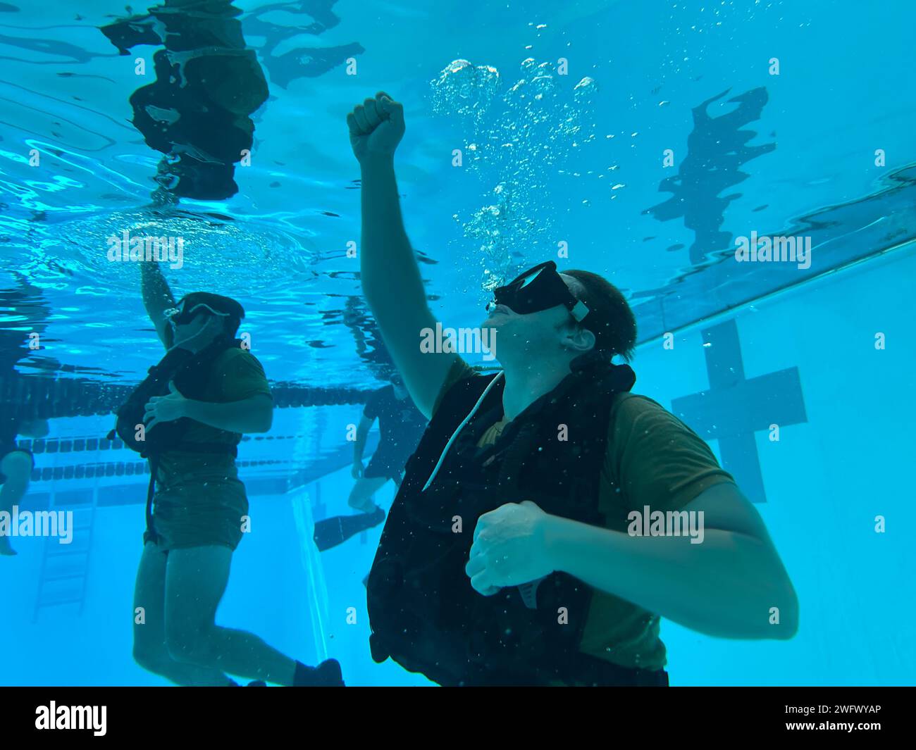 Green Berets with 5th Special Forces Group (Airborne) ascend to surface ...