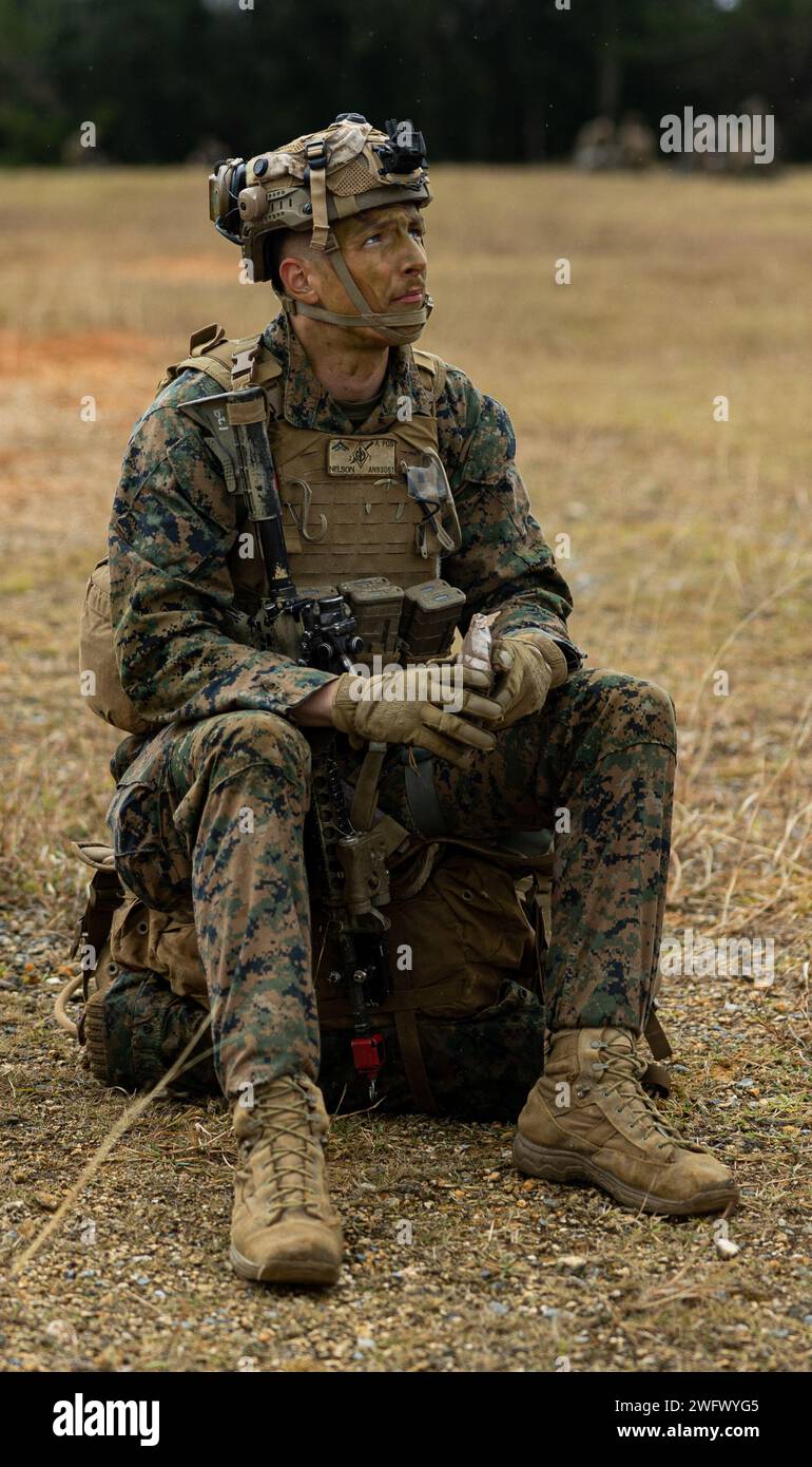 U.S. Marine Corps Lance Cpl. Alexander Nelson eats a meal, ready-to-eat during the 3d Marine ...