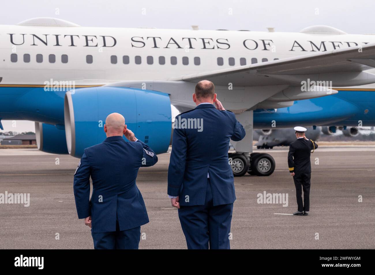 U.S. Armed Forces leaders salute the arrival of U.S. President Joe ...