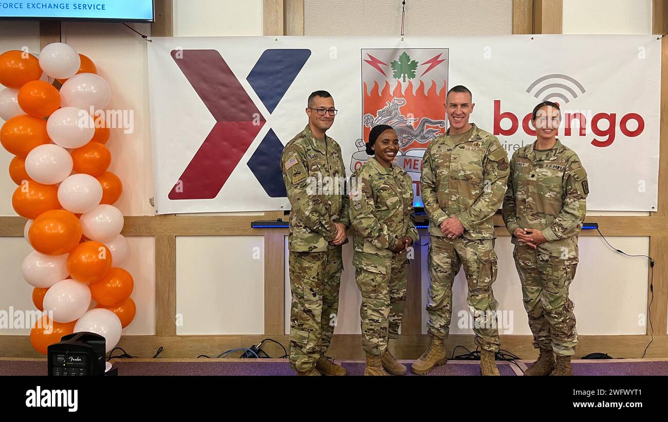 From left: Command Sgt. Maj. Mahoma Tello, 307th Expeditionary Signal ...