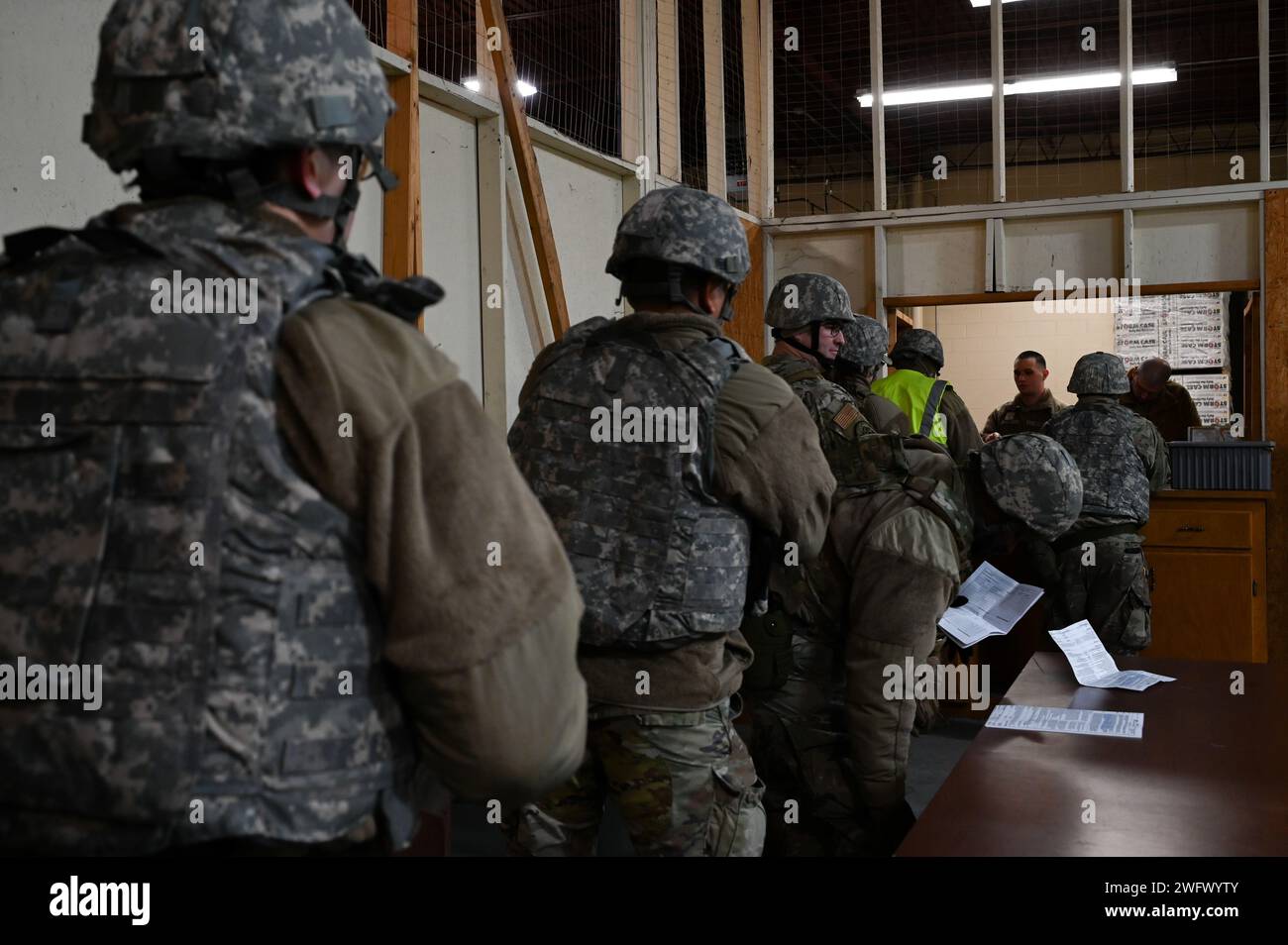 U.S. Airmen assigned to the 4th Civil Engineer Squadron are issued ...