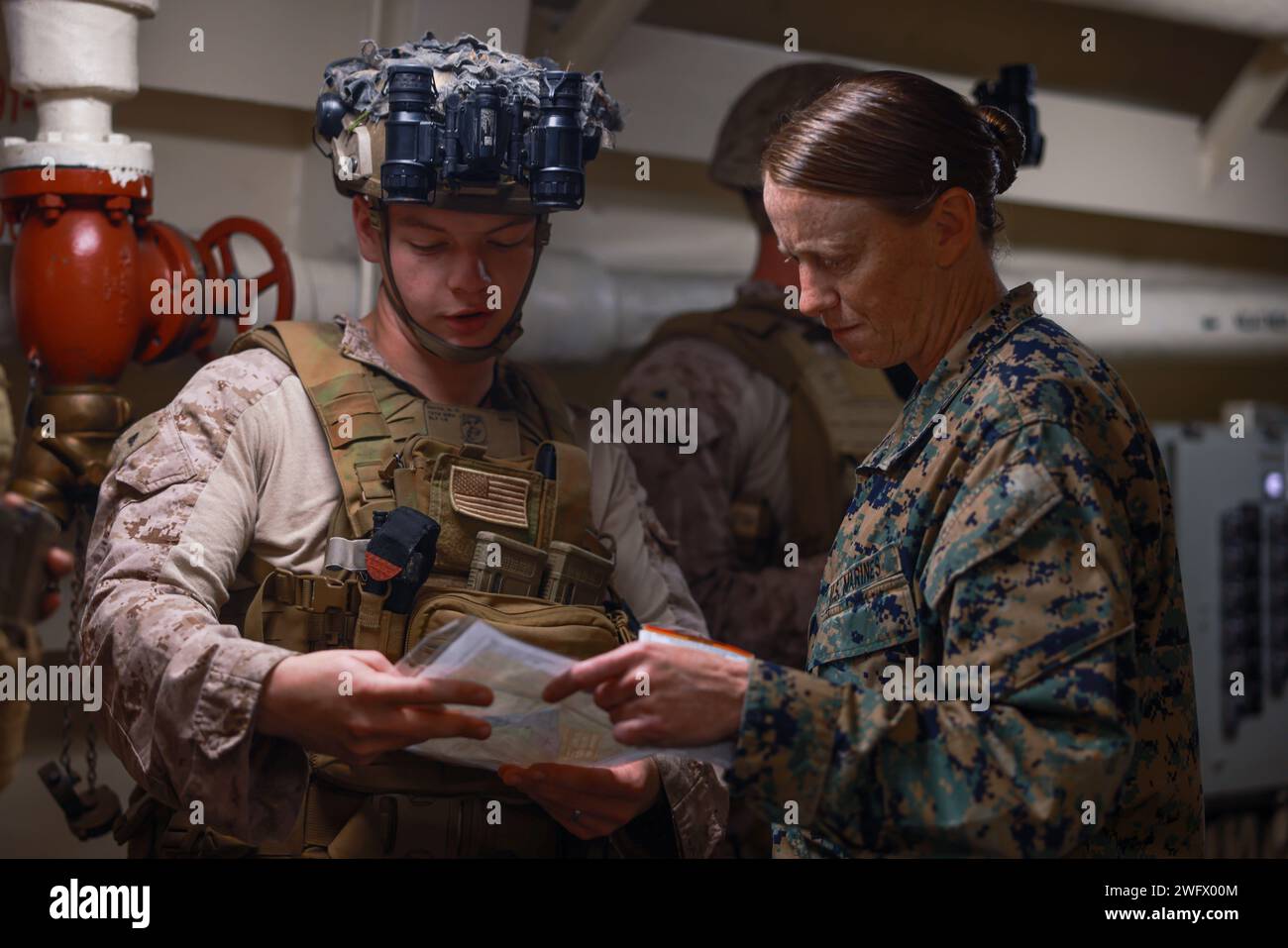 U.S. Marine Corps Lance Cpl. Noah Smith, left, a rifleman assigned to ...