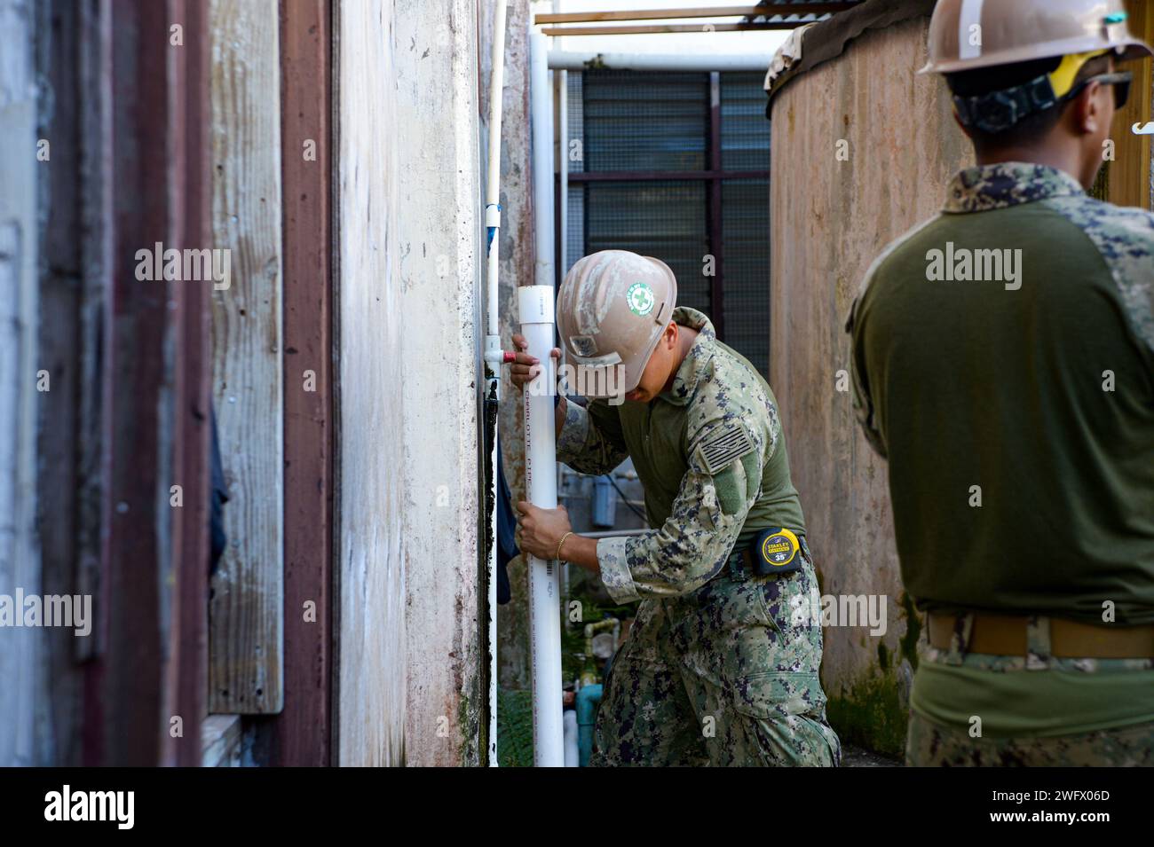 U.S. Navy Utilitiesman 2nd Class Anthony Hellis, from Clayton, North ...