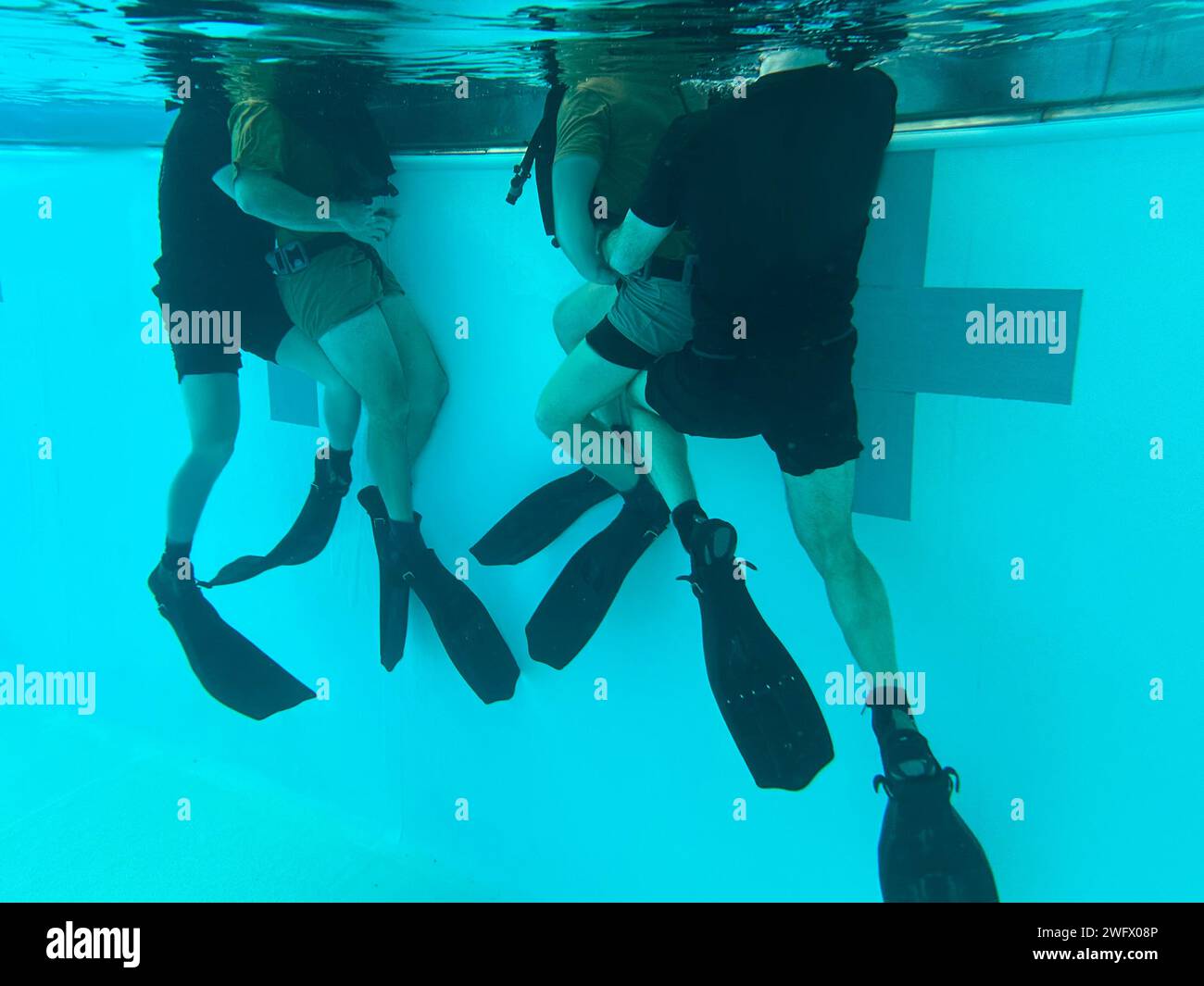Green Berets with 5th Special Forces Group (Airborne) equip divers with ...