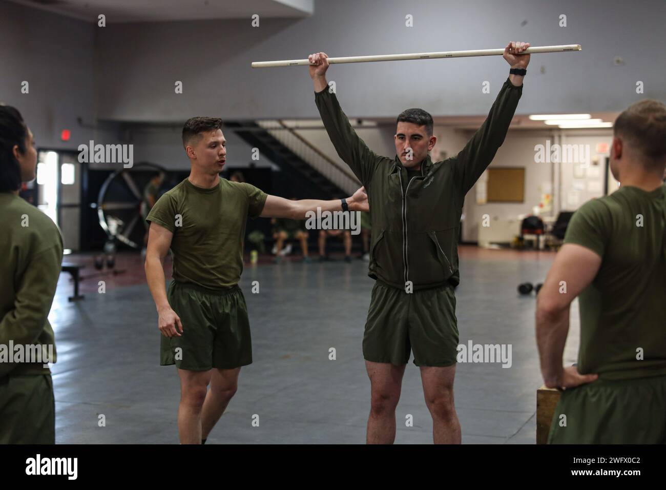 U.S. Marine Corps Sgt. Donald Wenlund, left, a radio operator with ...