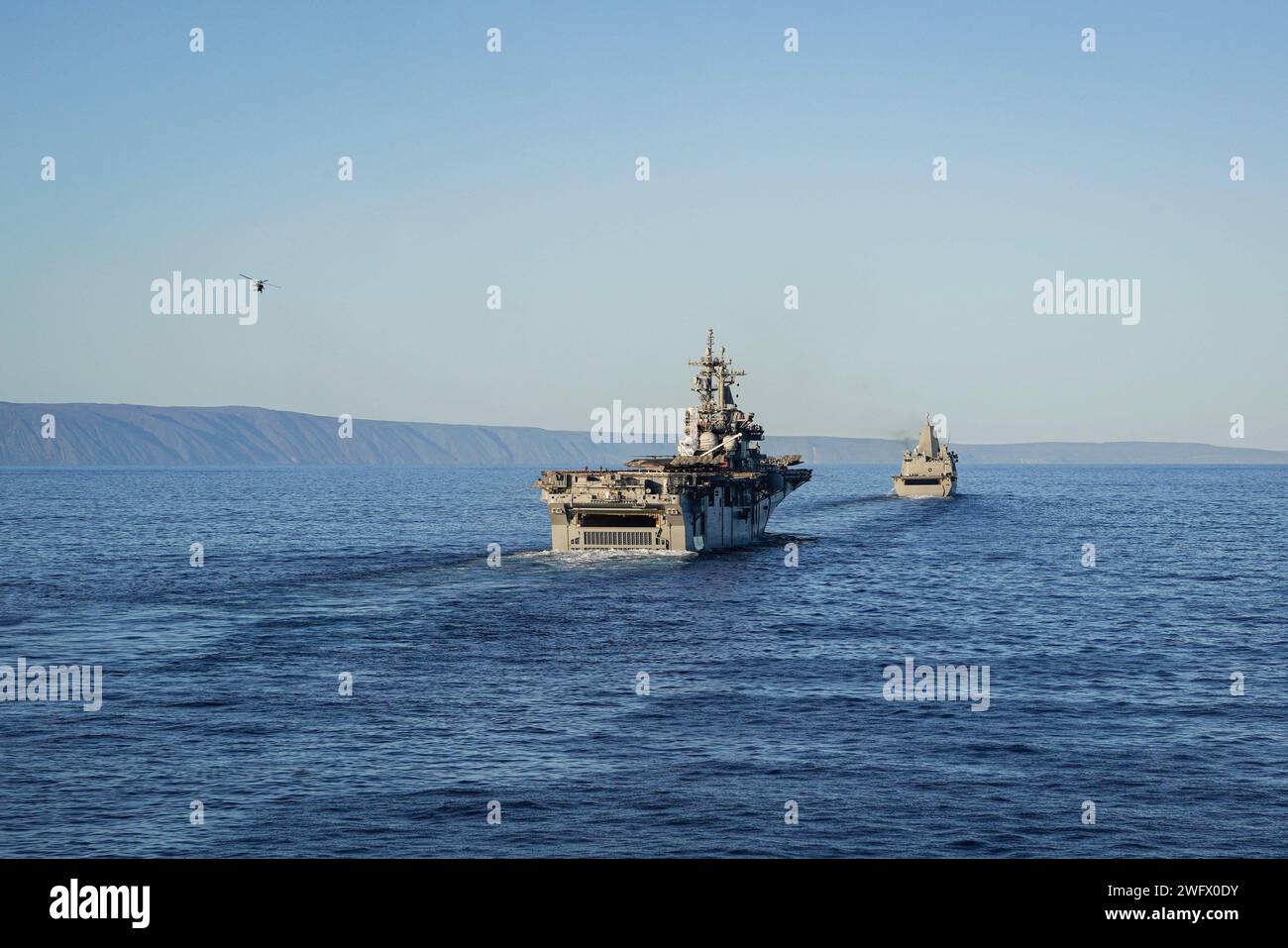 Amphibious transport dock ship USS Somerset (LPD 25), right, and ...