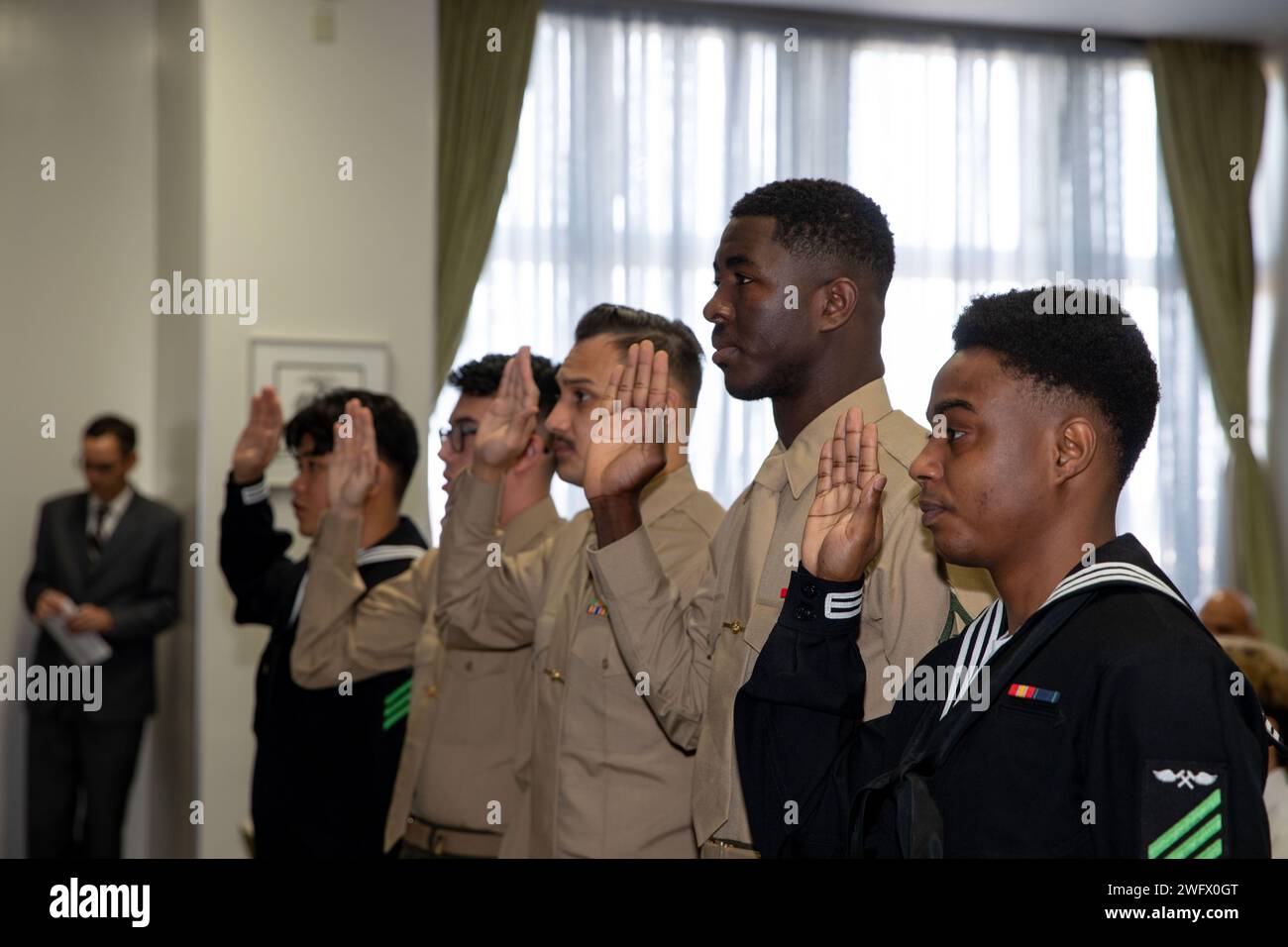 U.S. service members at Marine Corps Air Station Iwakuni swear in ...