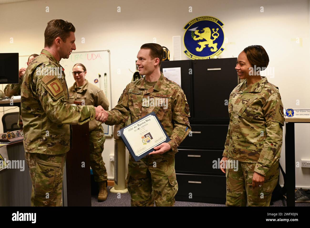 U.S. Air Force Col. Ryan Garlow, left, 100th Air Refueling Wing ...