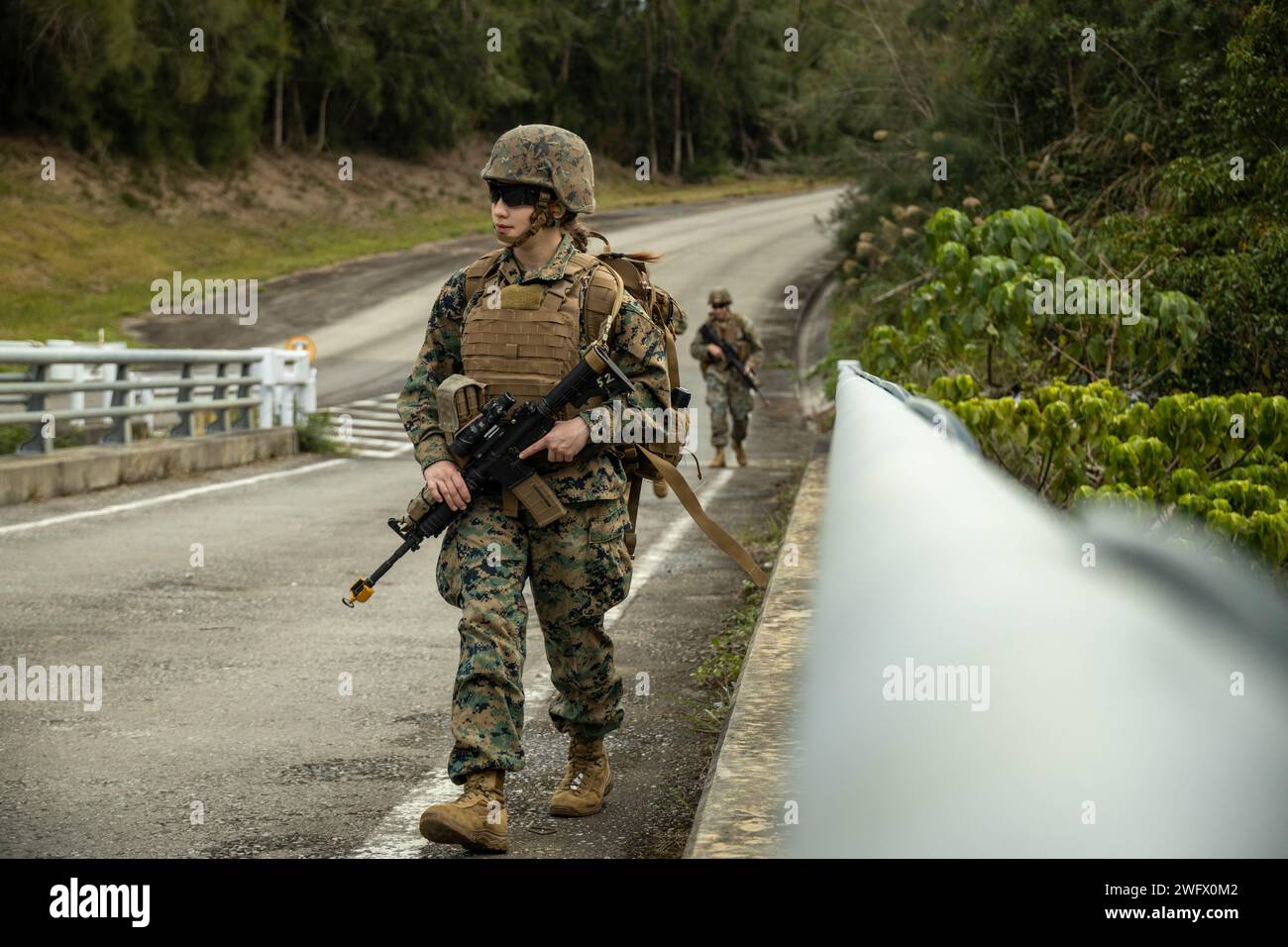 U.S. Marine Corps Lance Cpl. Elina Podkamennaya, a refrigeration and ...