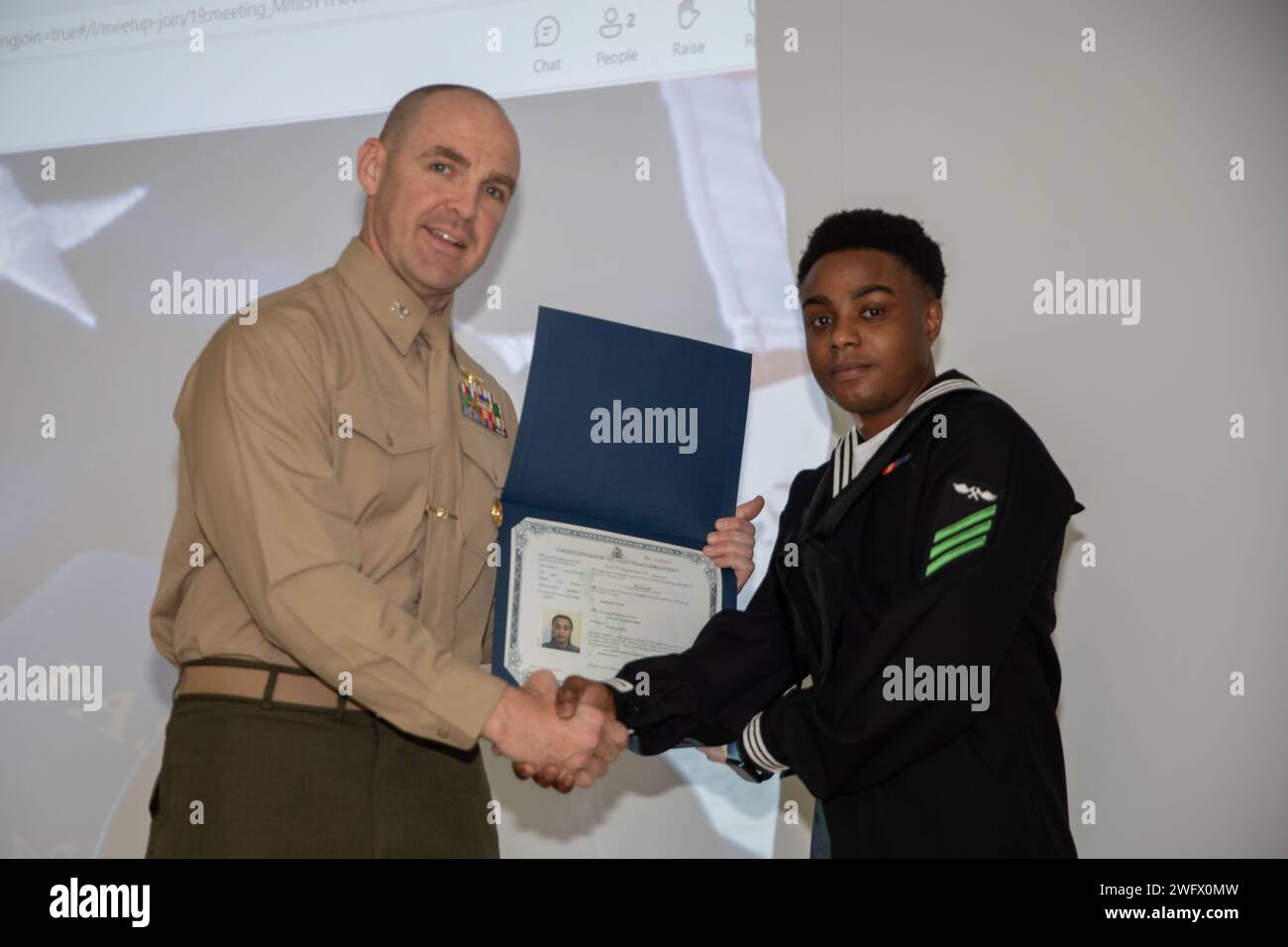 U.S. Marine Corps Col. Kyle Shoop, left, the commanding officer of ...