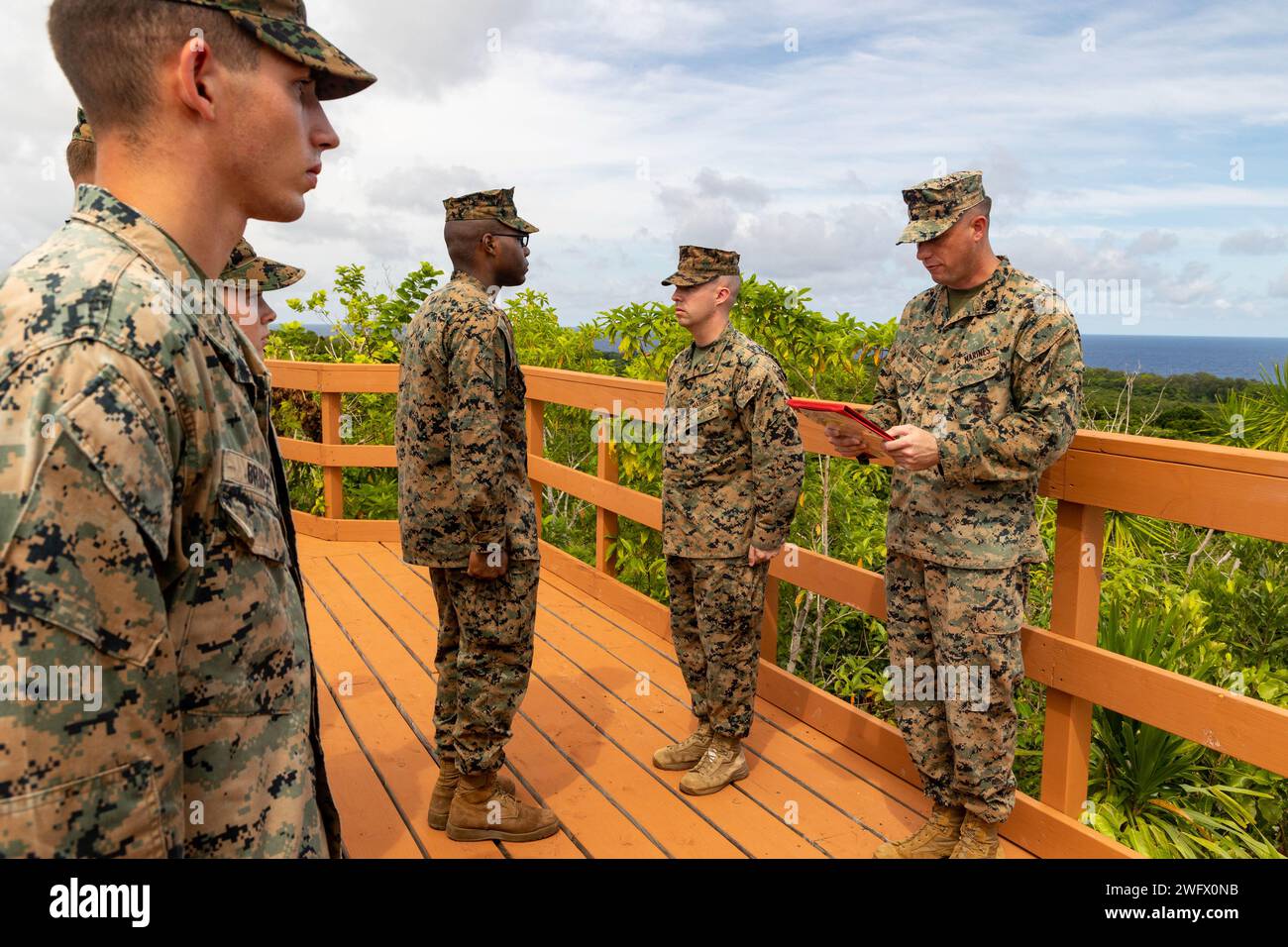 U.S. Marine Corps Cpl. Trent Henry, center, a native of El Paso, Texas ...