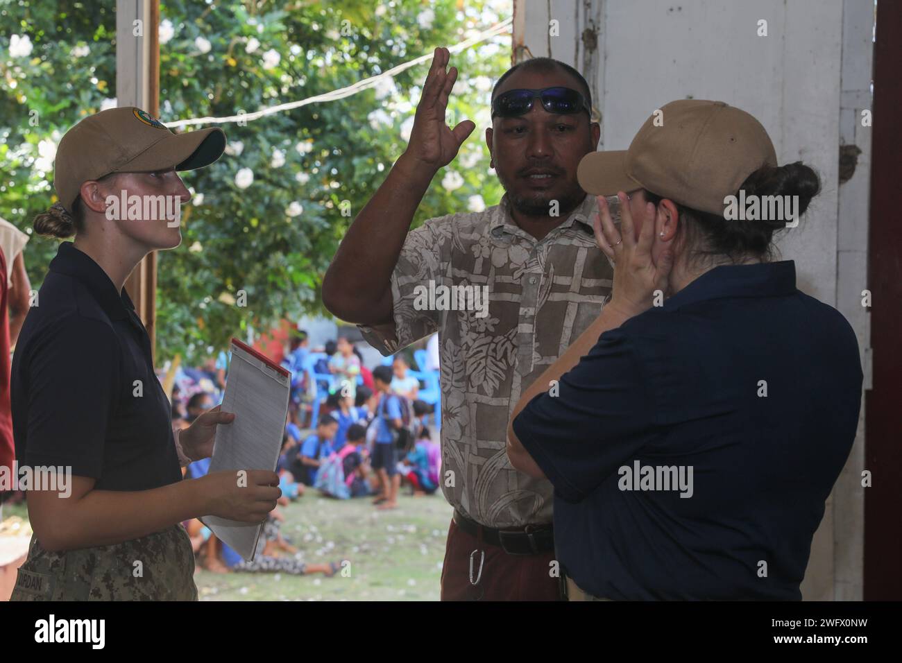 U.S. Navy Lt. Cmdr. Amie Heim, from Buffalo, New York, right, and Lt ...