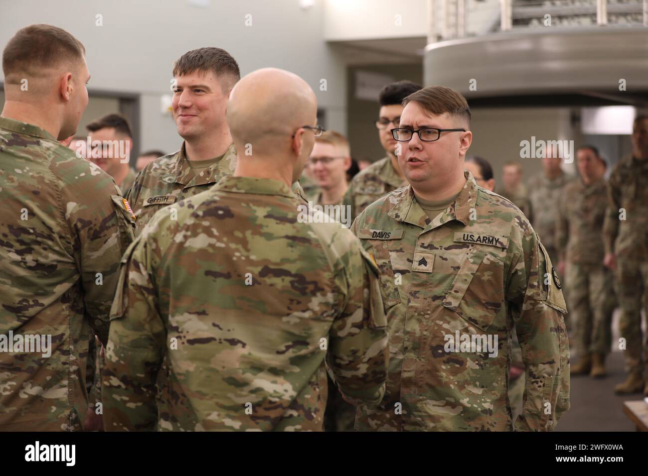 11 Soldiers of the 35th Infantry Division Artillery were promoted to ...