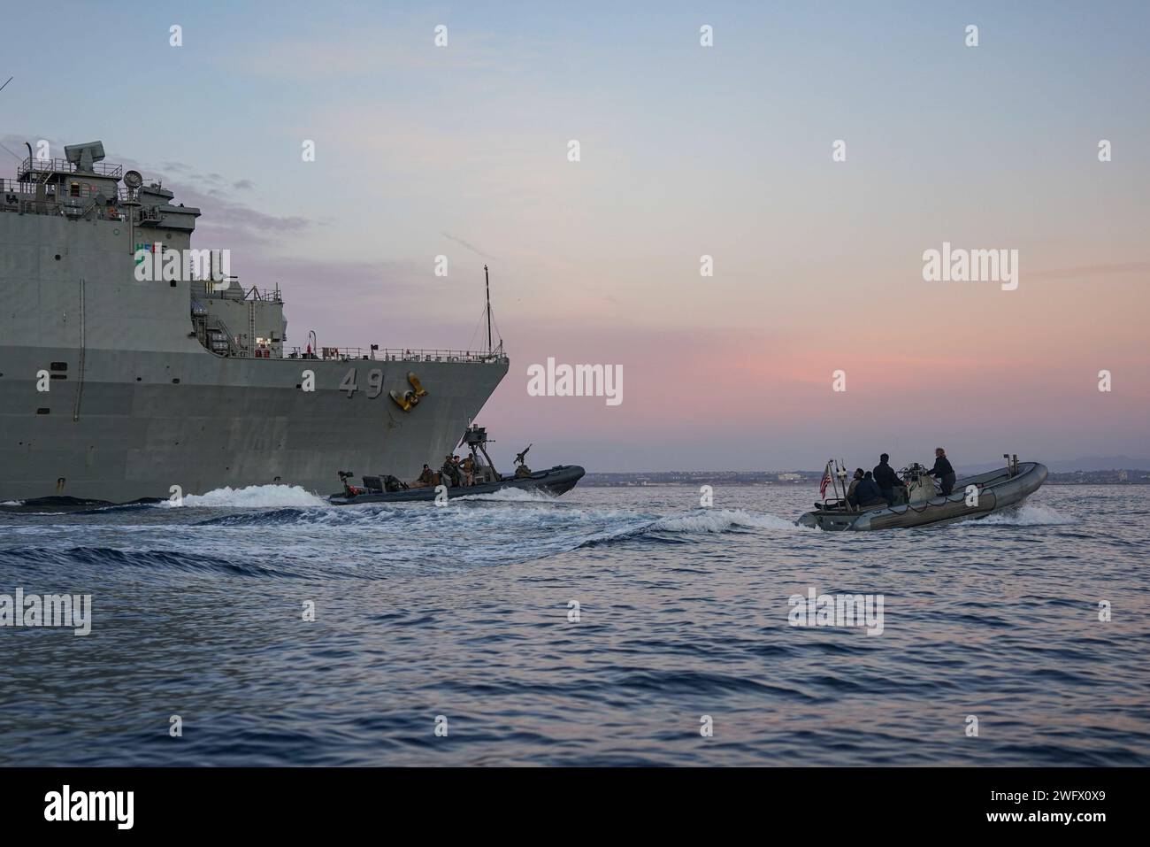 The amphibious dock landing ship USS Harpers Ferry (LSD 4), conducts ...