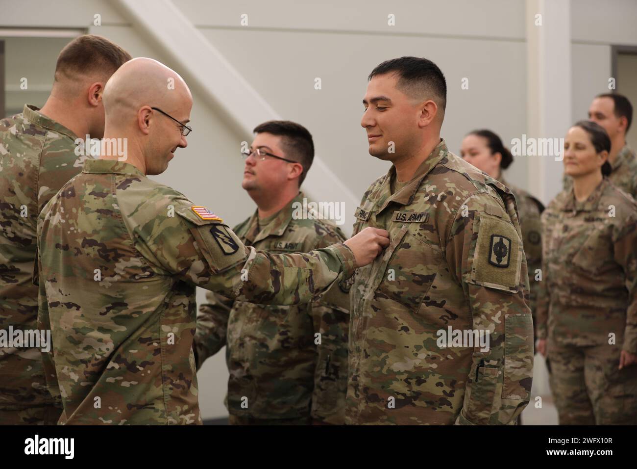 11 Soldiers of the 35th Infantry Division Artillery were promoted to ...